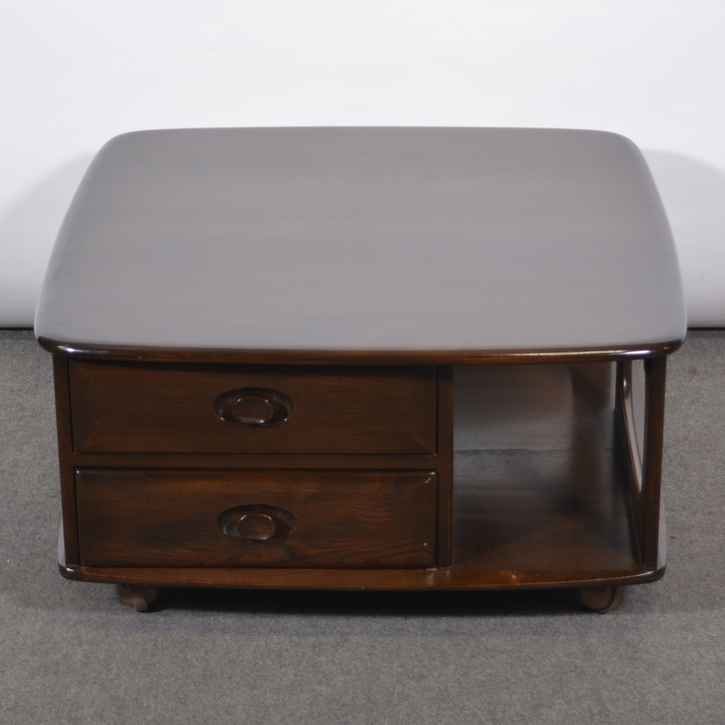 Lot 490 - Ercol Pandora's Box coffee table,