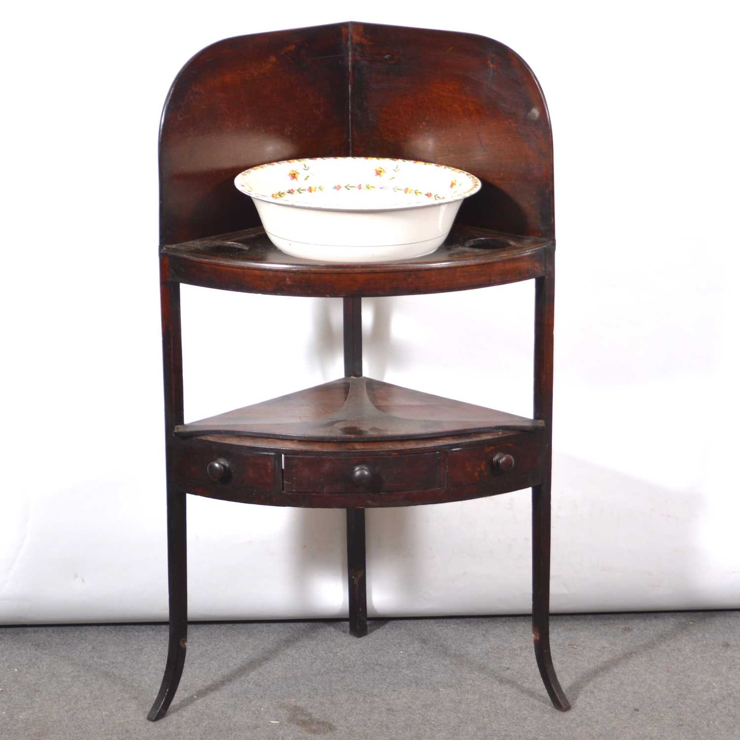 Lot 533 - George III mahogany corner washstand and jug