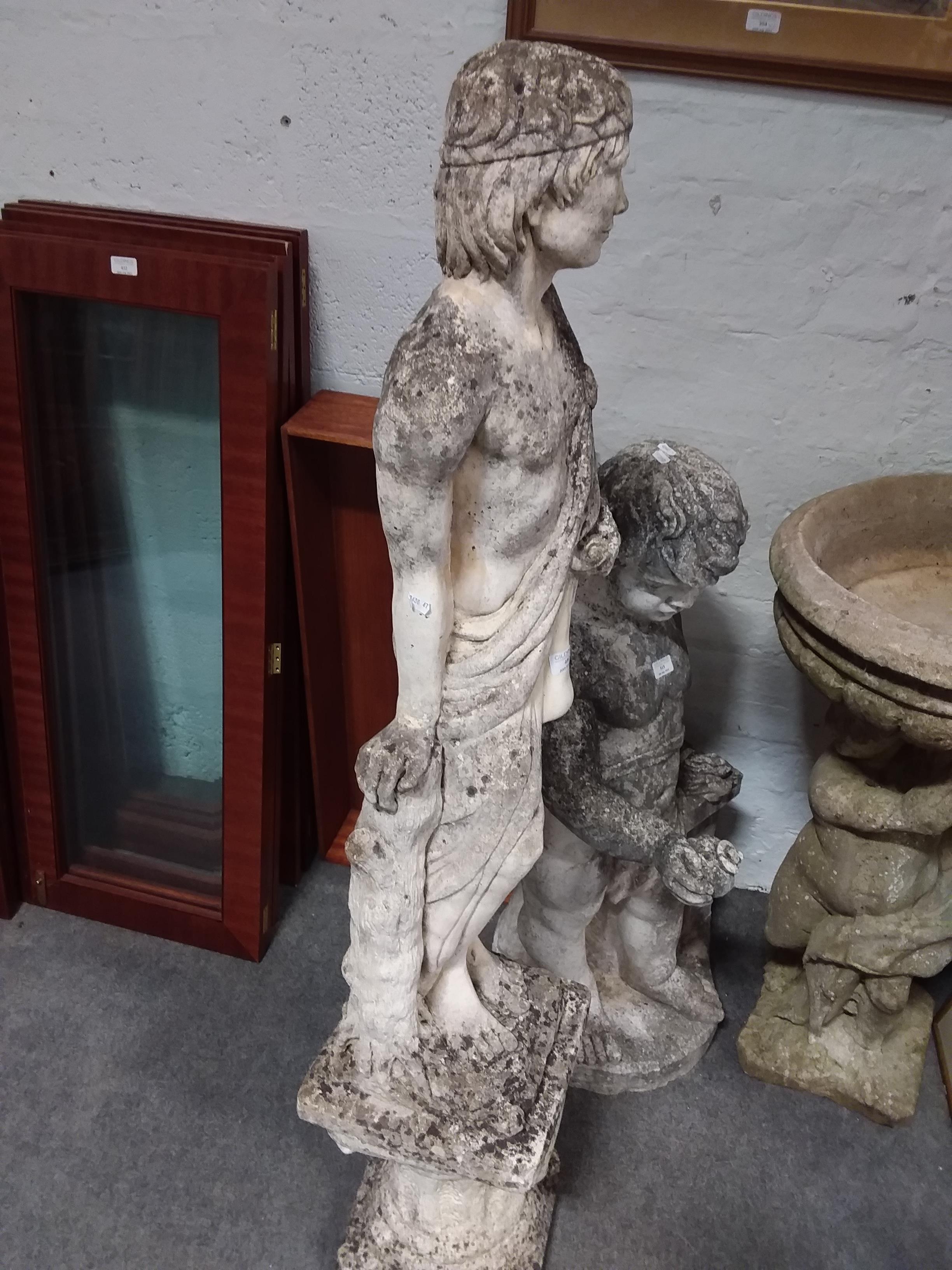 Lot 482 - Cast concrete garden statue and a spelter
