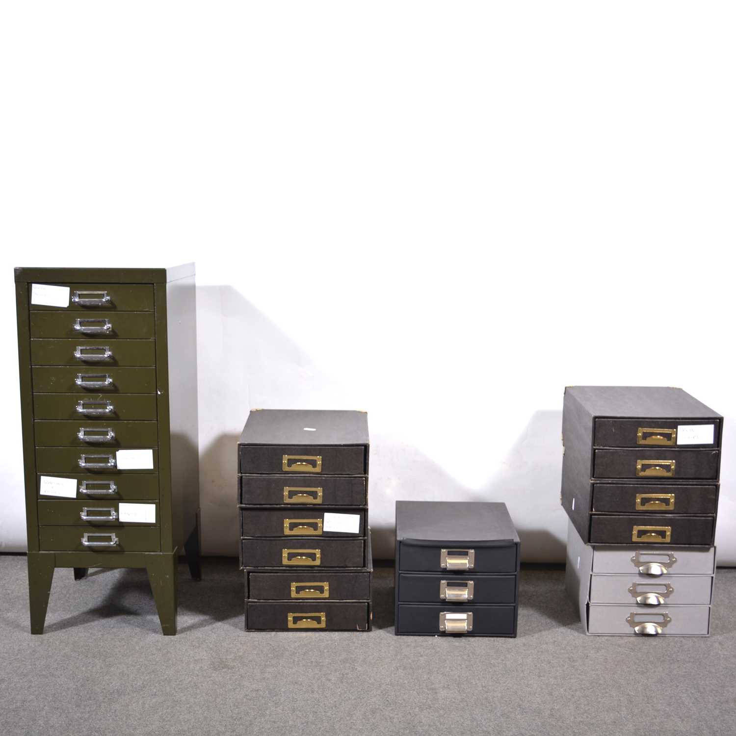 Lot 531 - Small metal chest of drawers and seven box