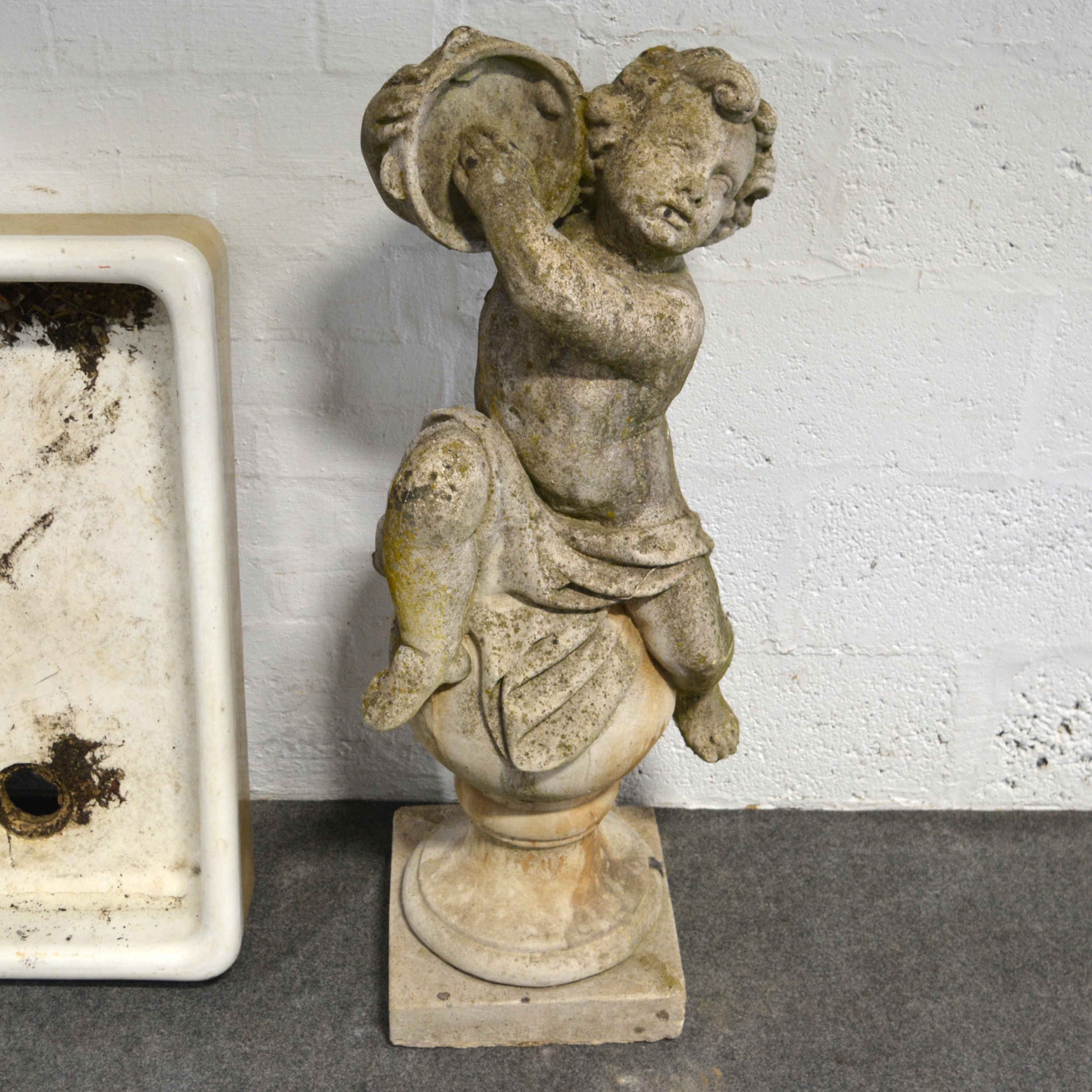 Lot 520 - Cast concrete garden statue,