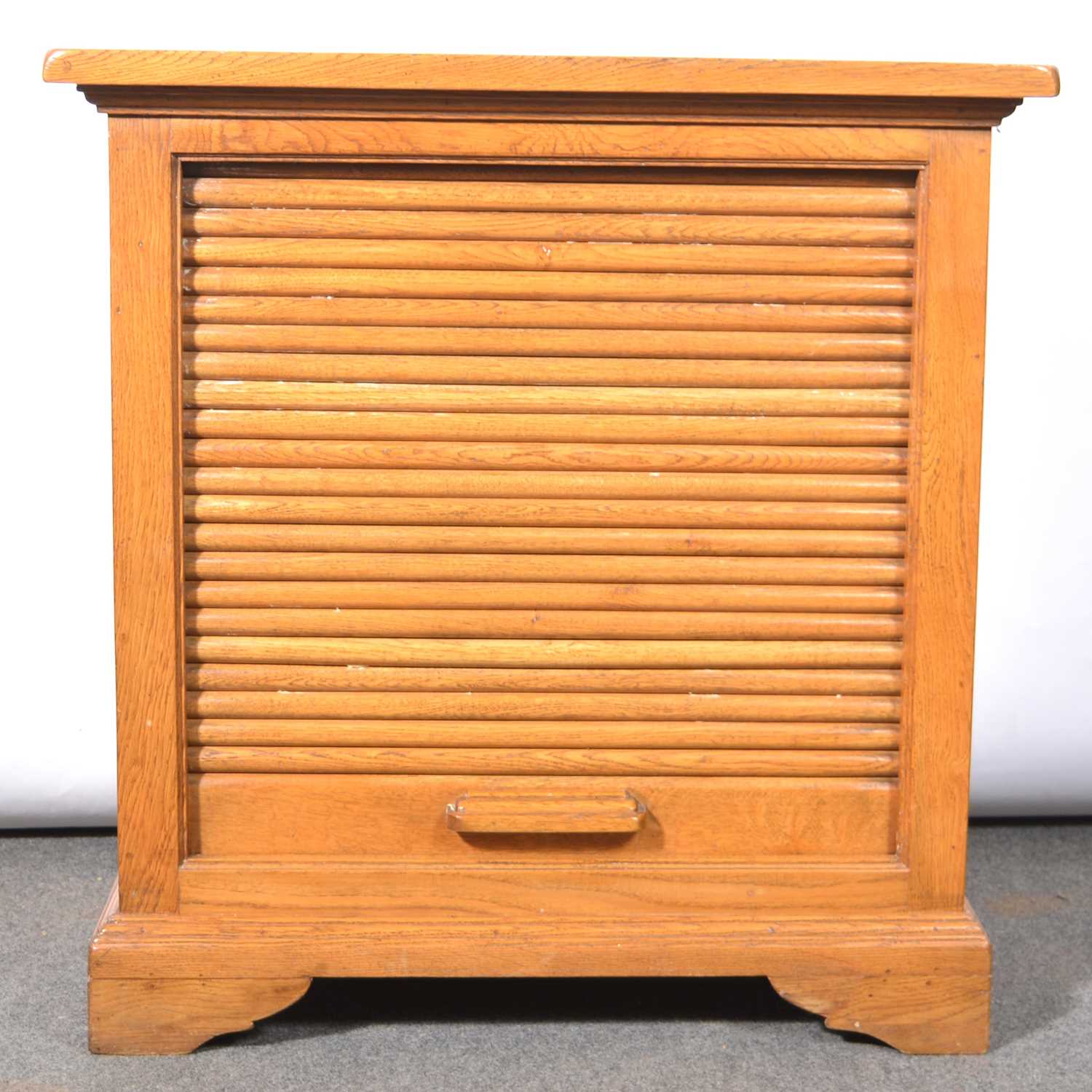 Lot 570 - Oak tambour front chest