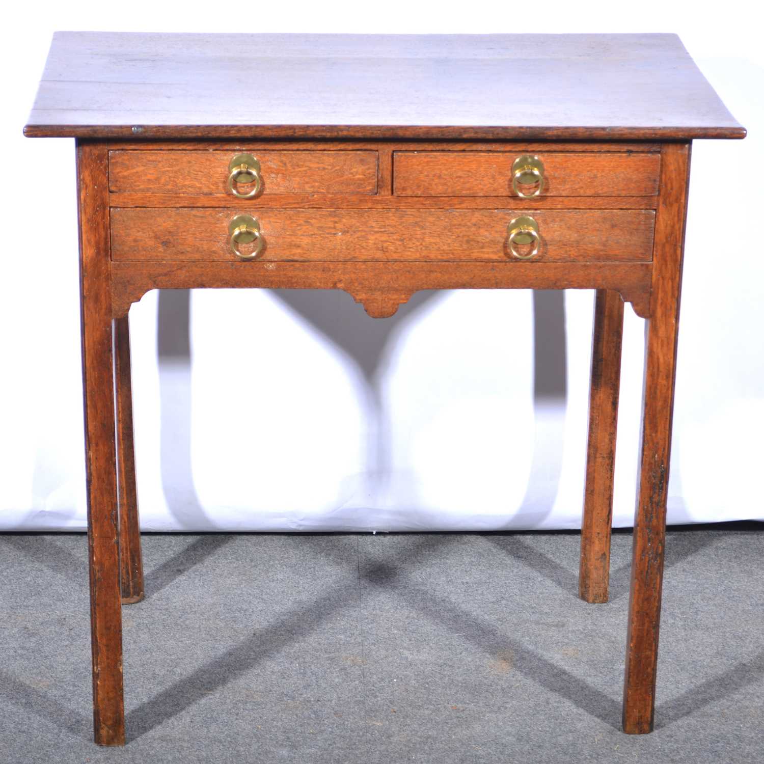 Lot 597 - George III oak side table,