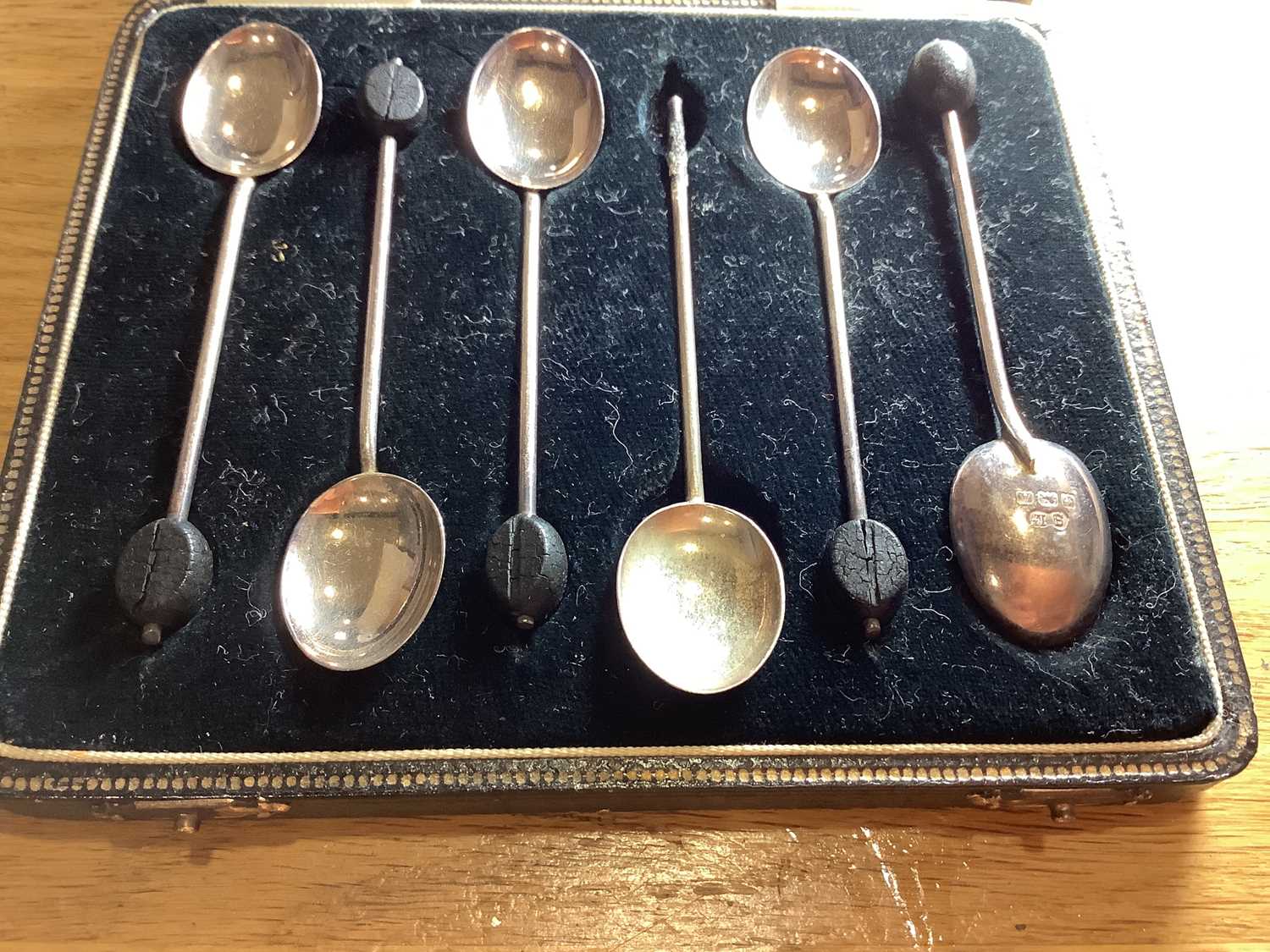 Lot 266 - Silver condiment spoons, three cased sets of