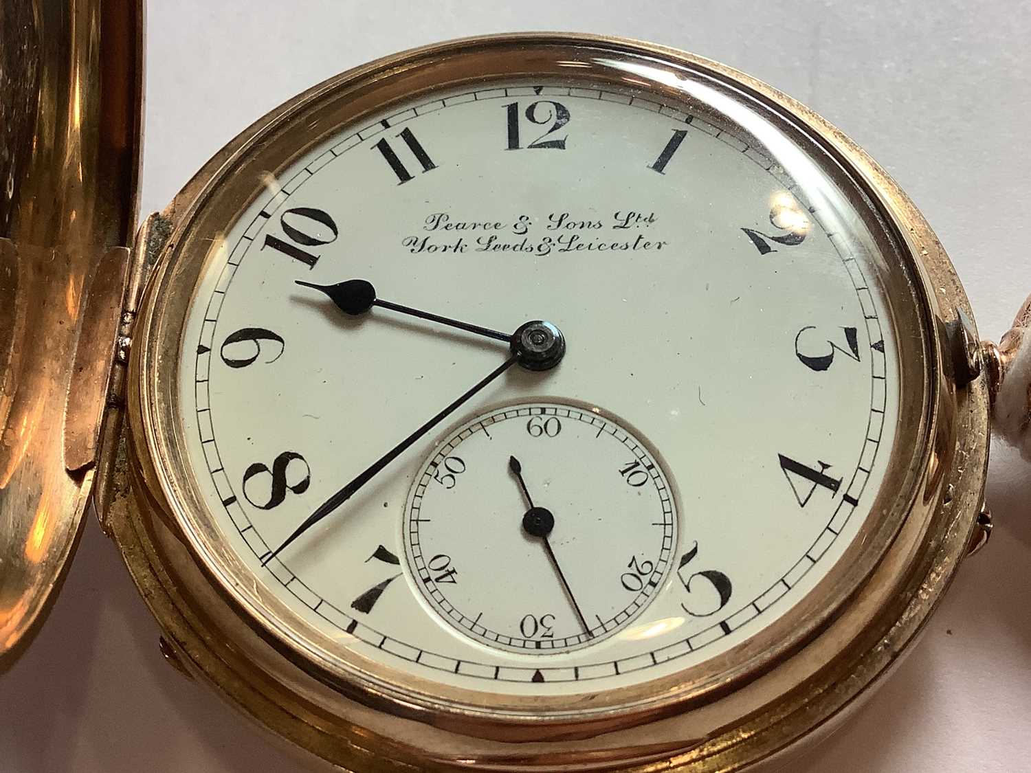 Lot 109 - Pearce & Sons - a 9 carat yellow gold