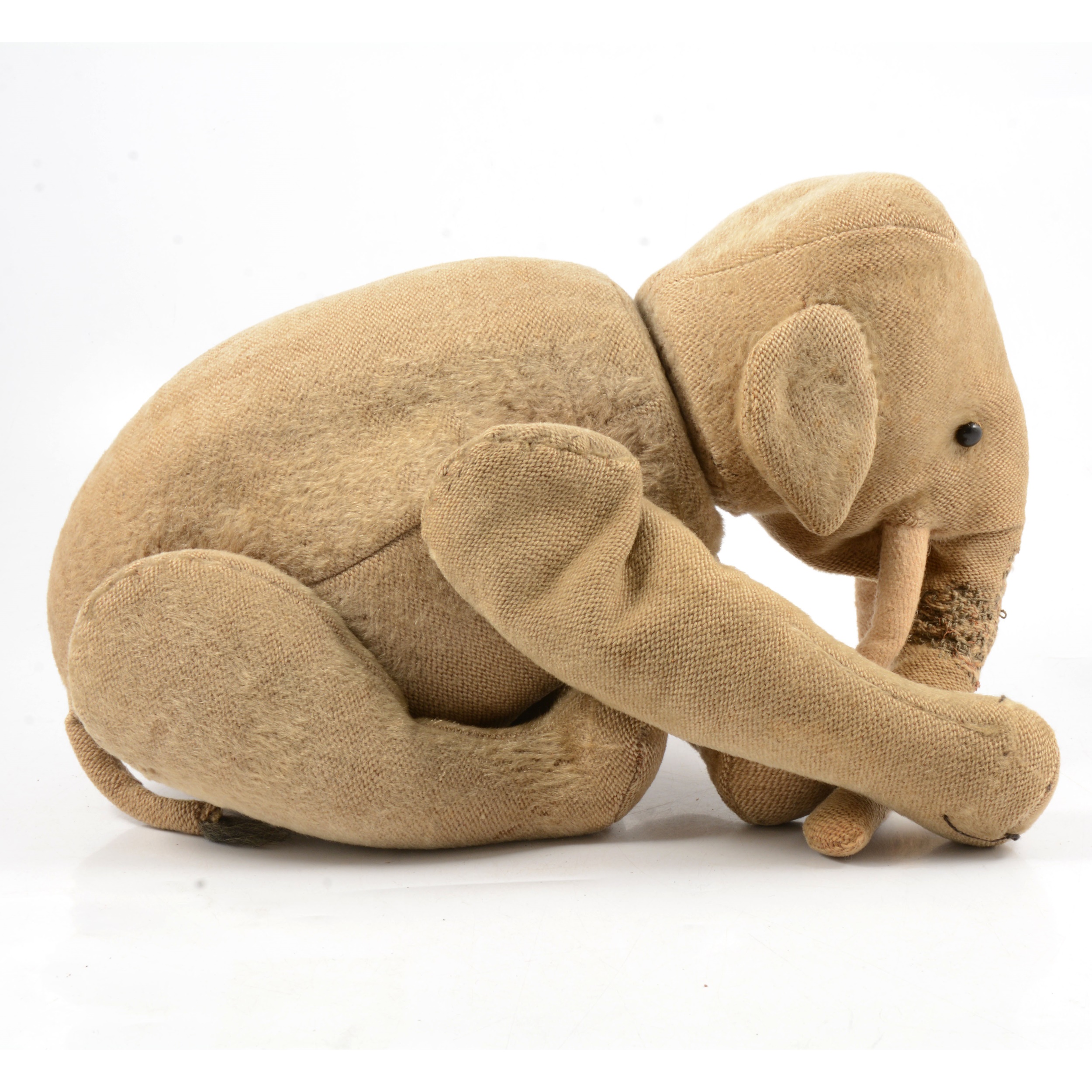 Lot 295 - An early 20th century toy straw filled