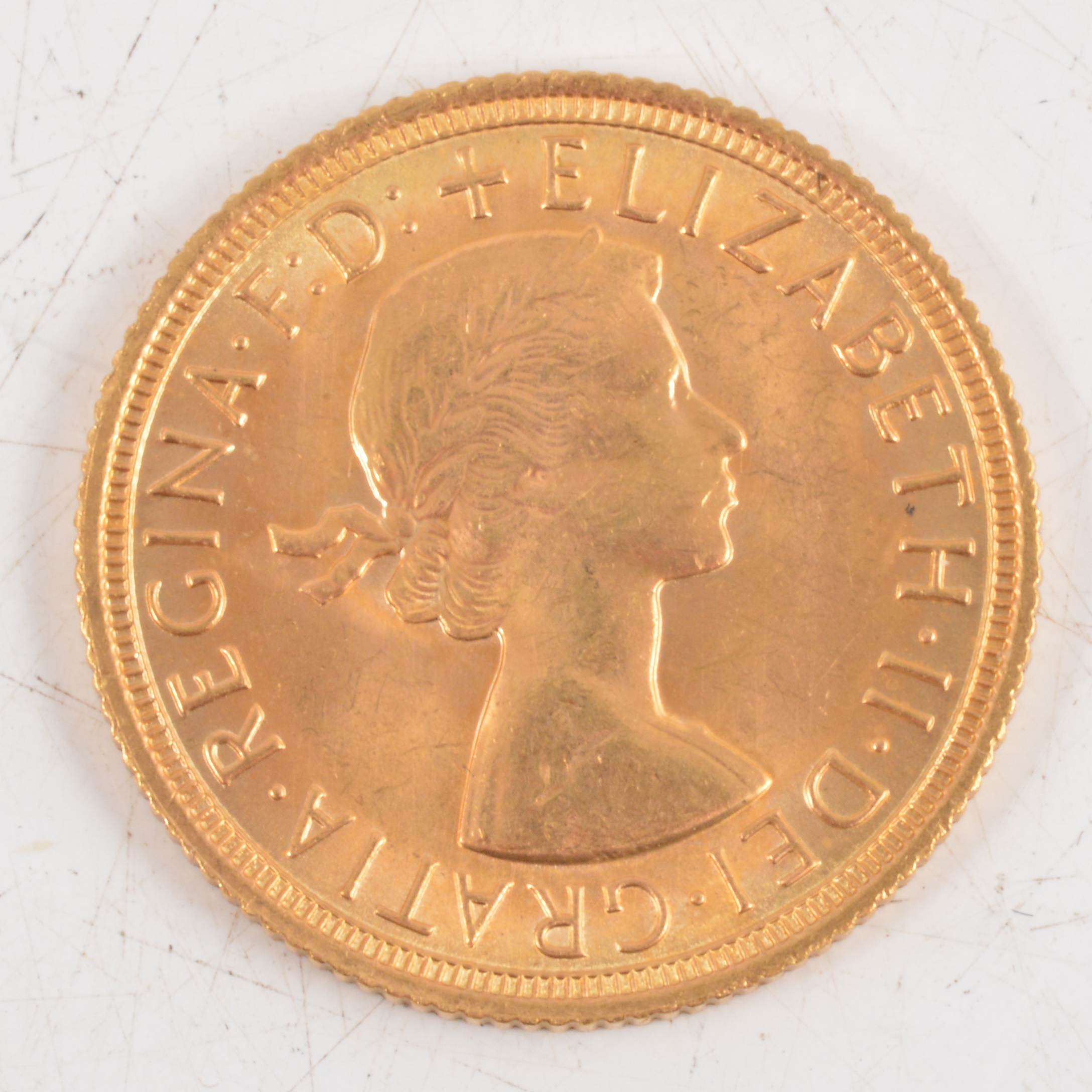 Lot 221 - Elizabeth II gold Sovereign coin, 1967, 8g.