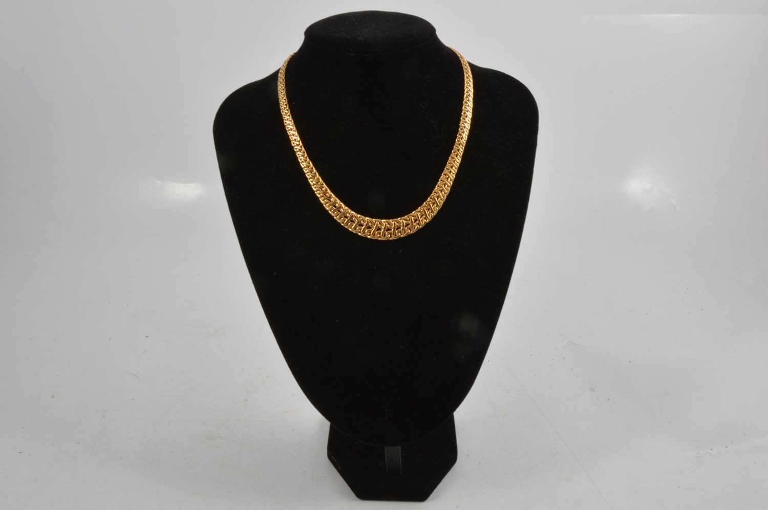 Lot 290 - A yellow metal polished link necklace marked