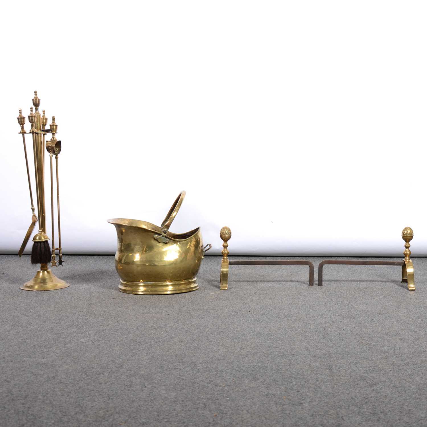 Lot 396 - Brass coal scuttle; fire brush set; and two