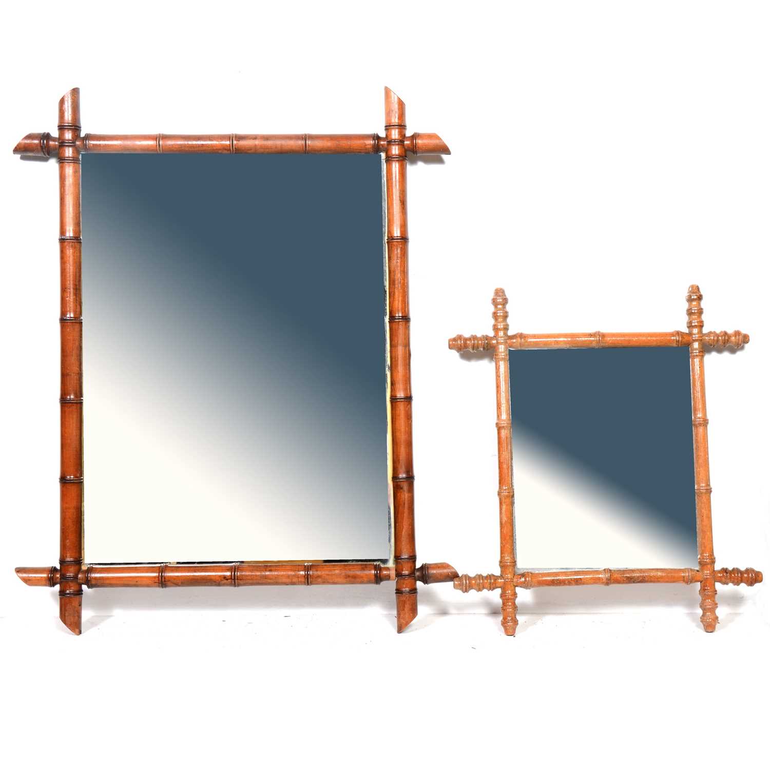 Lot 424 - Two bamboo framed wall mirrors,