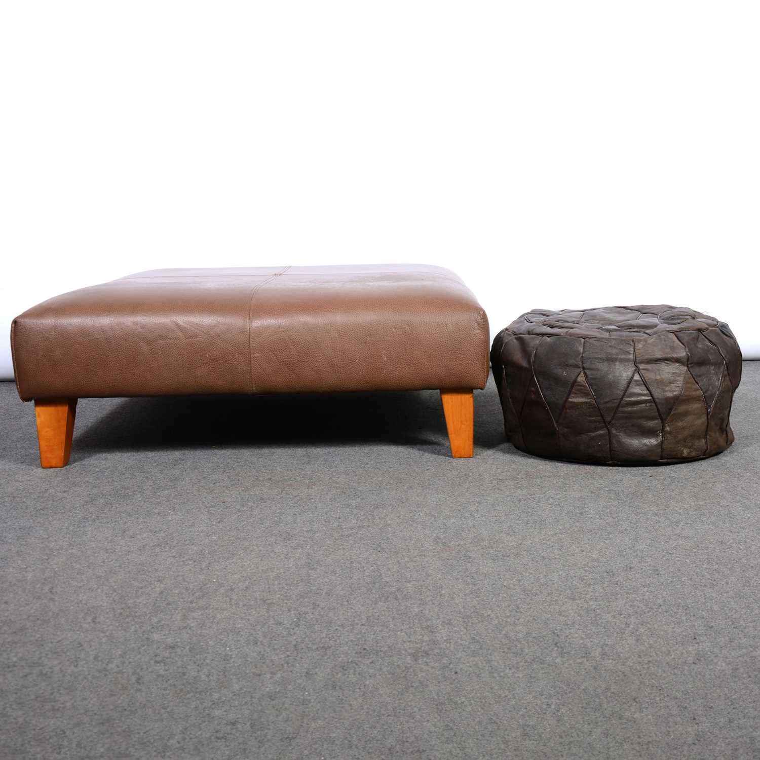 Lot 534 - Two contemporary leather footstools