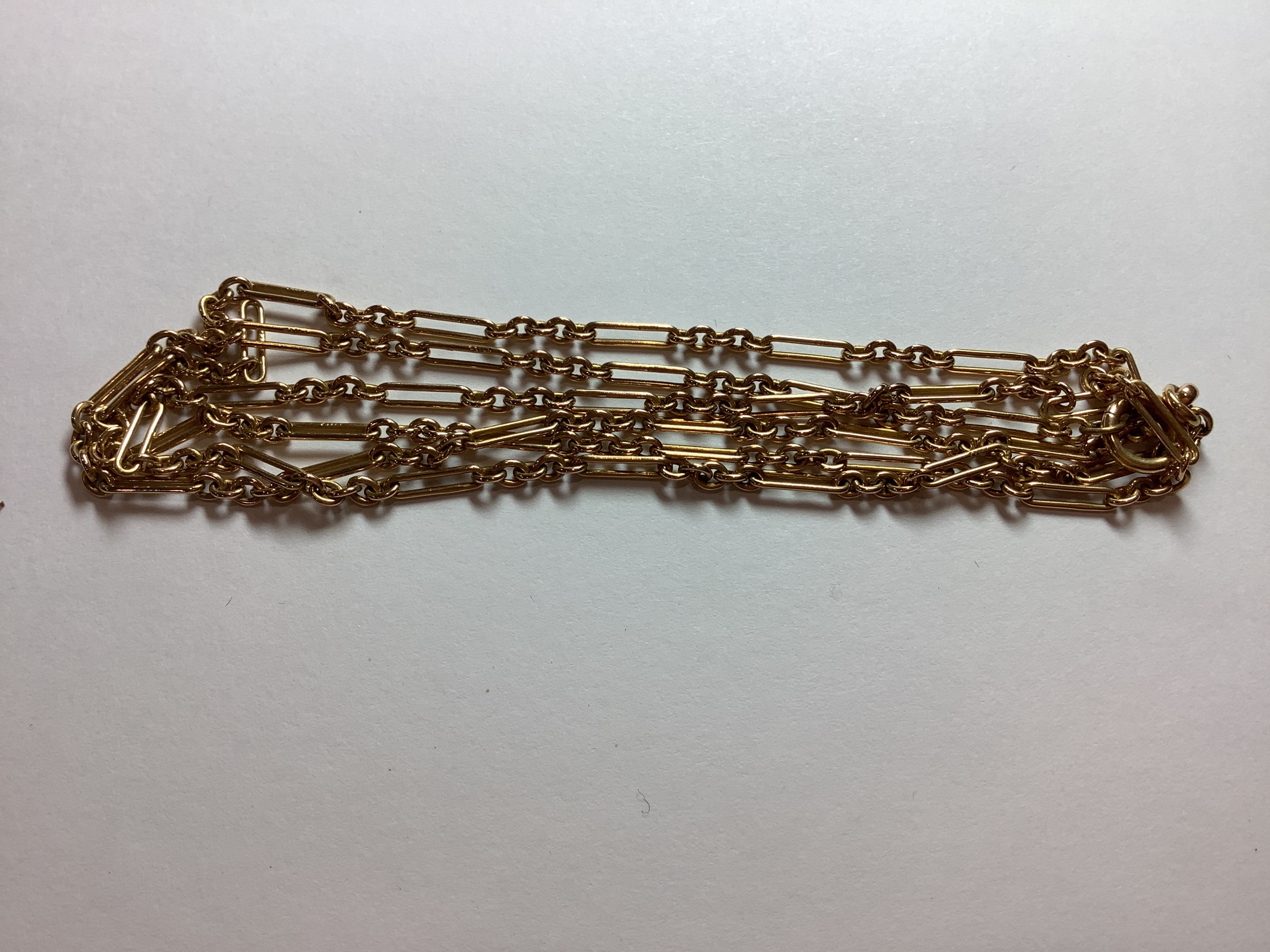 Lot 156 - A yellow metal chain link necklace.