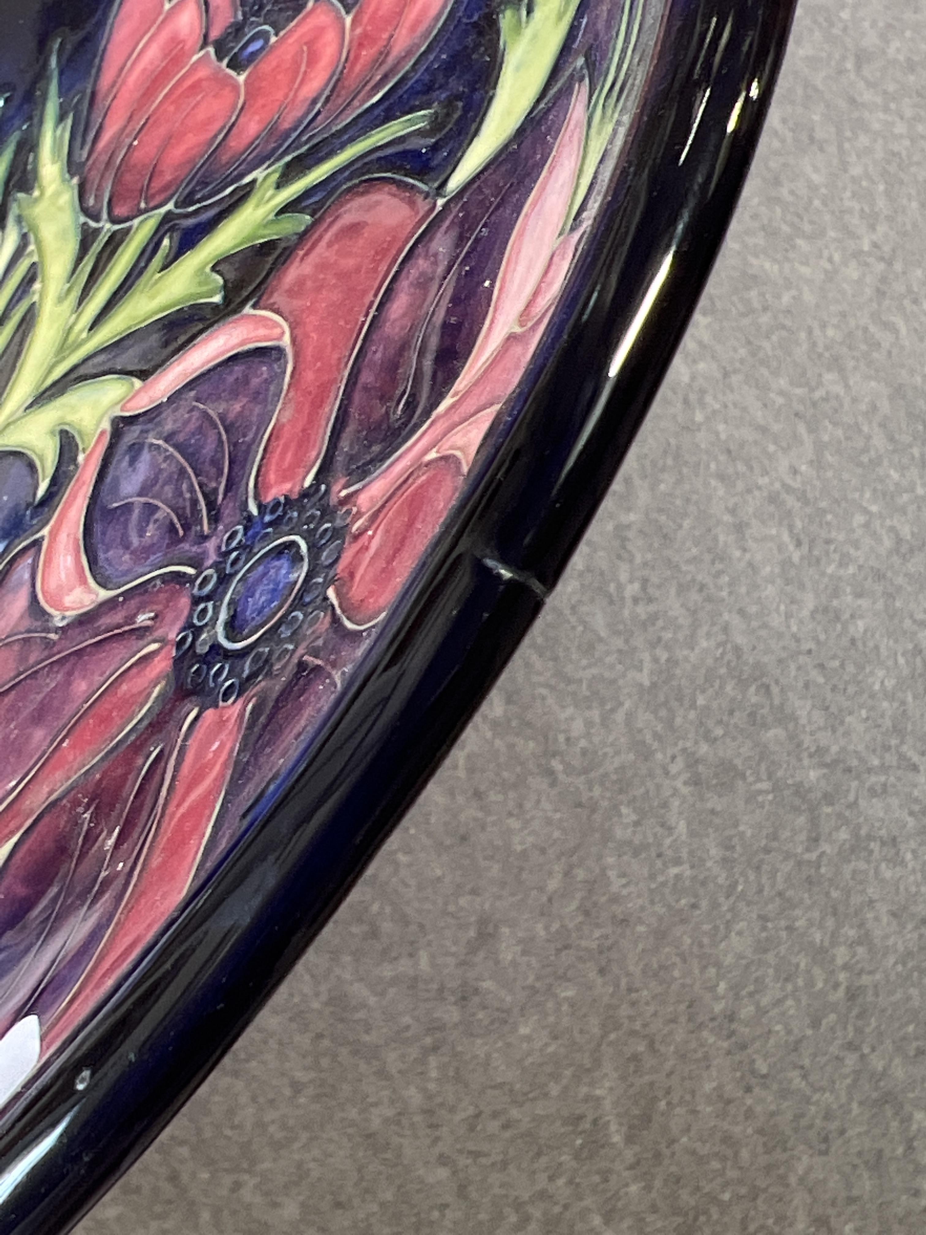 Lot 10 - Moorcroft pottery circular plate and a