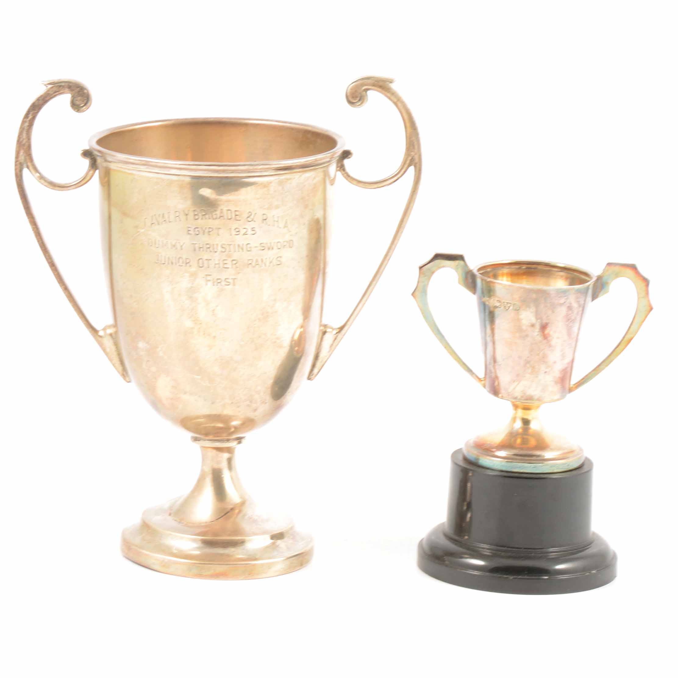 Lot 245 - Four silver trophy cups,