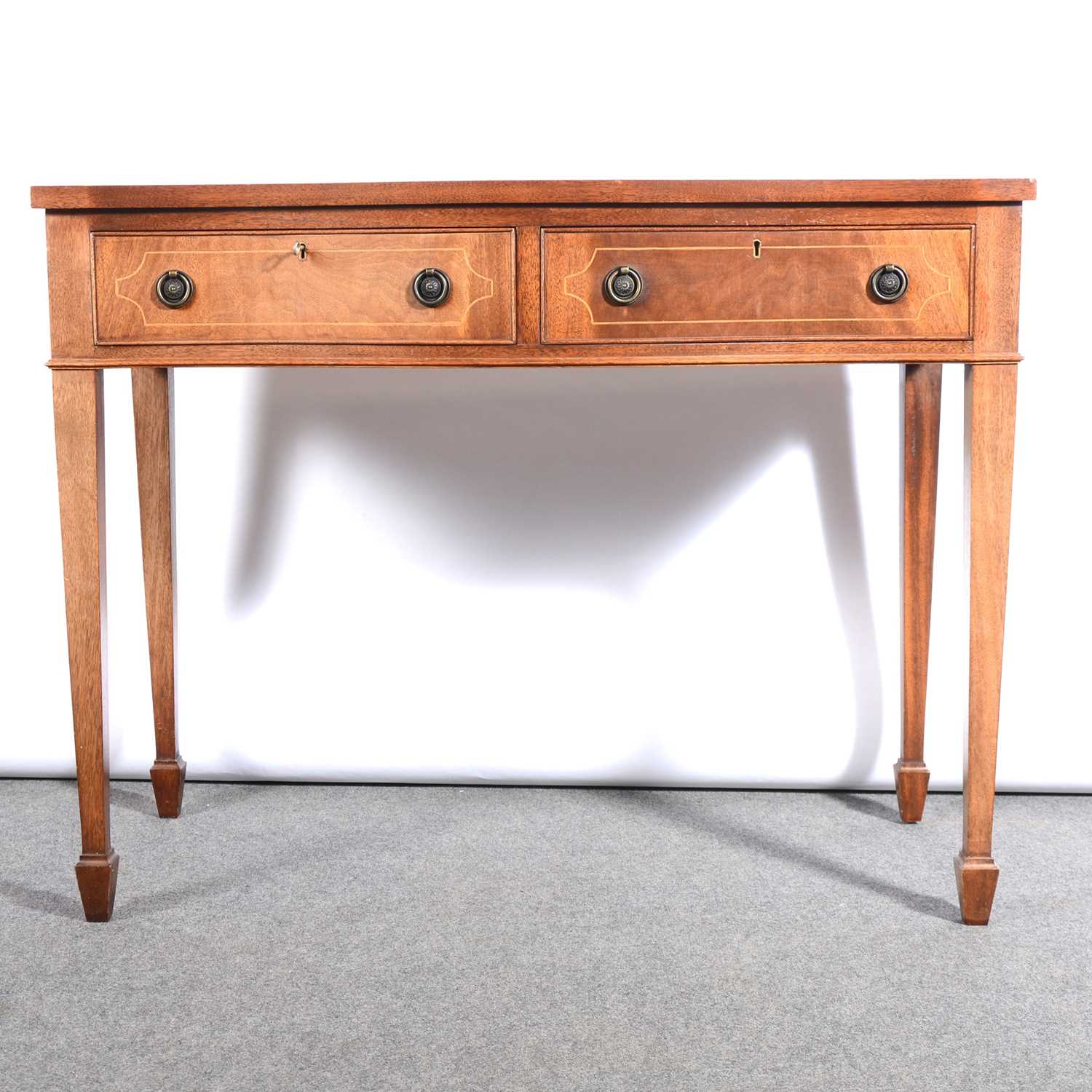 Lot 526 - Reproduction mahogany hall table and a
