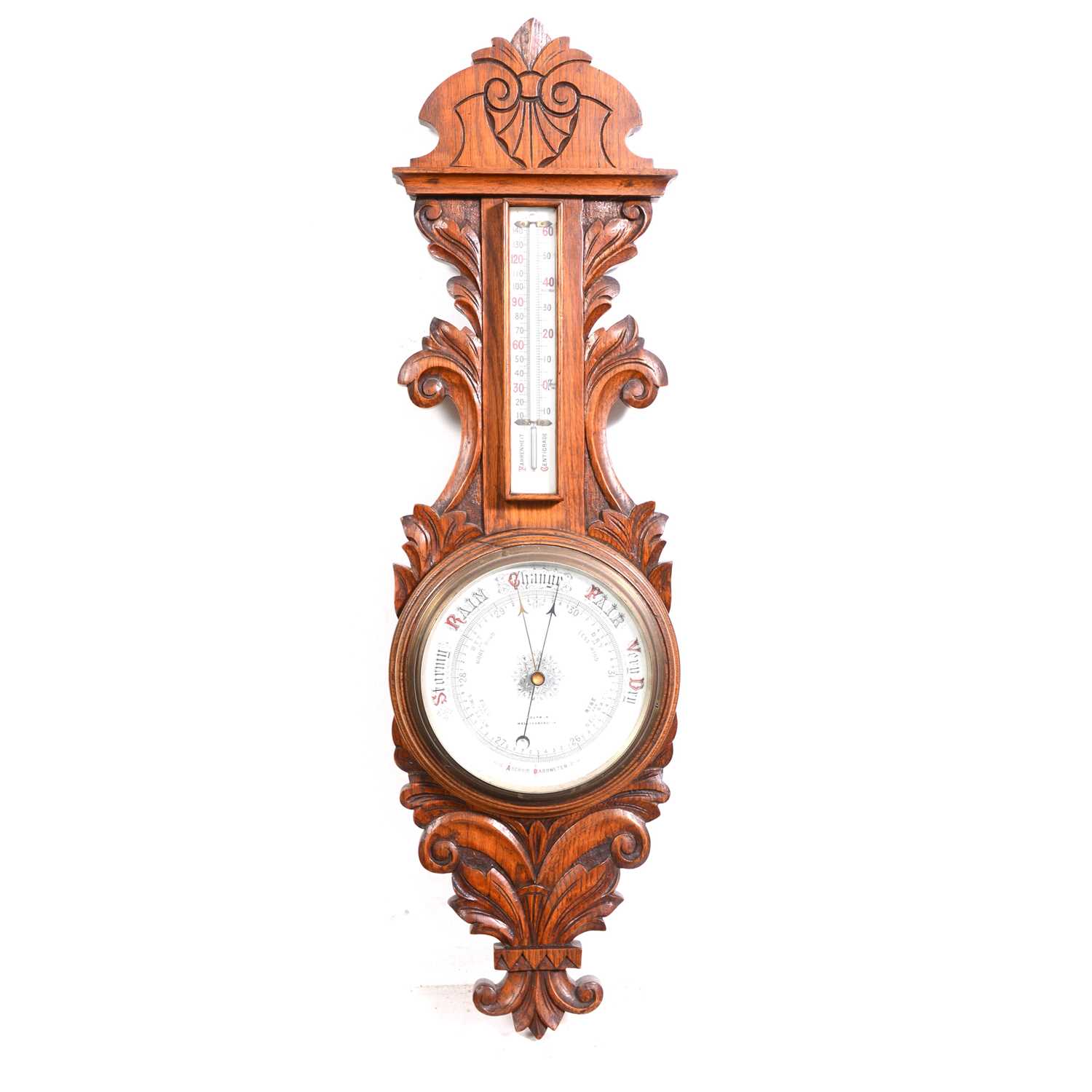 Lot 479 - Victorian carved oak aneroid barometer and