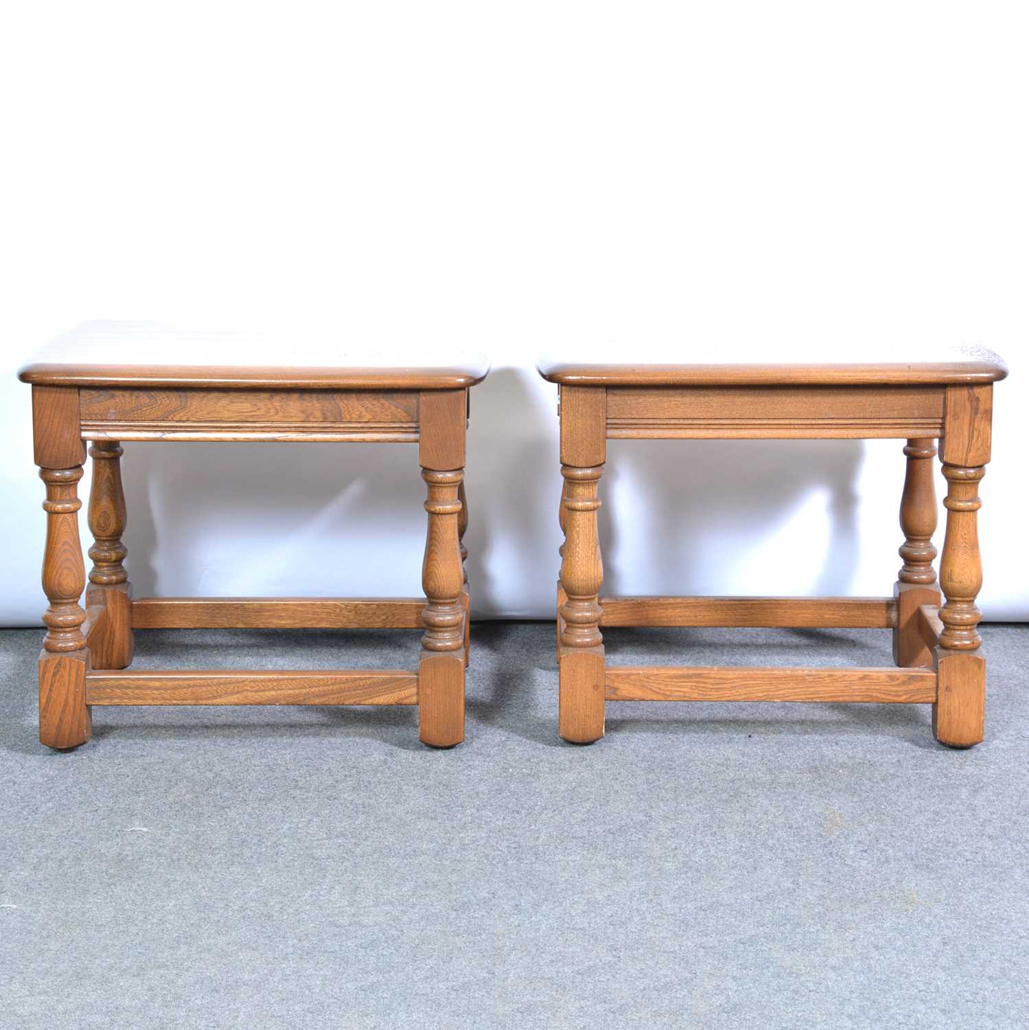 Lot 330 - Pair of Ercol elm lamp tables,