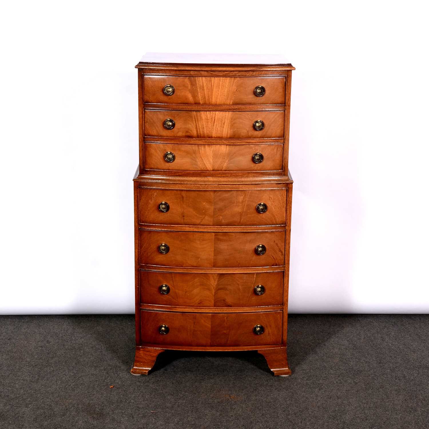 Lot 434 - Reproduction mahogany bowfront chest on