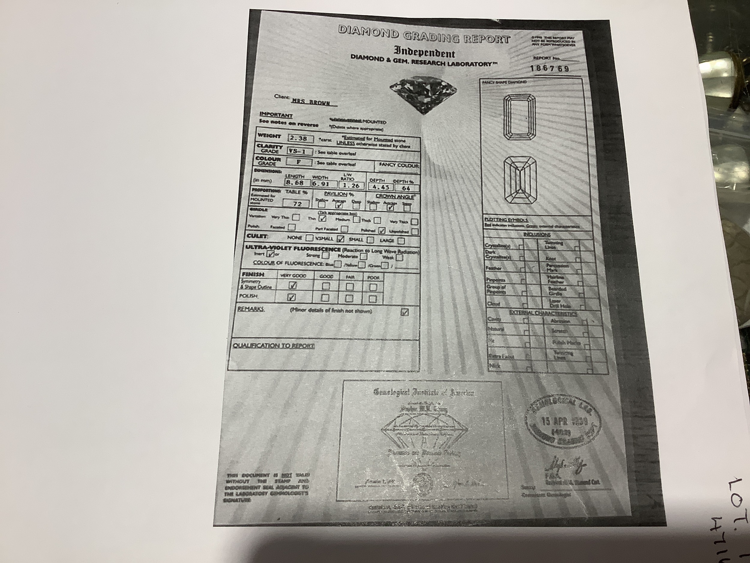 Lot 14 - A diamond solitaire ring, rectangular step