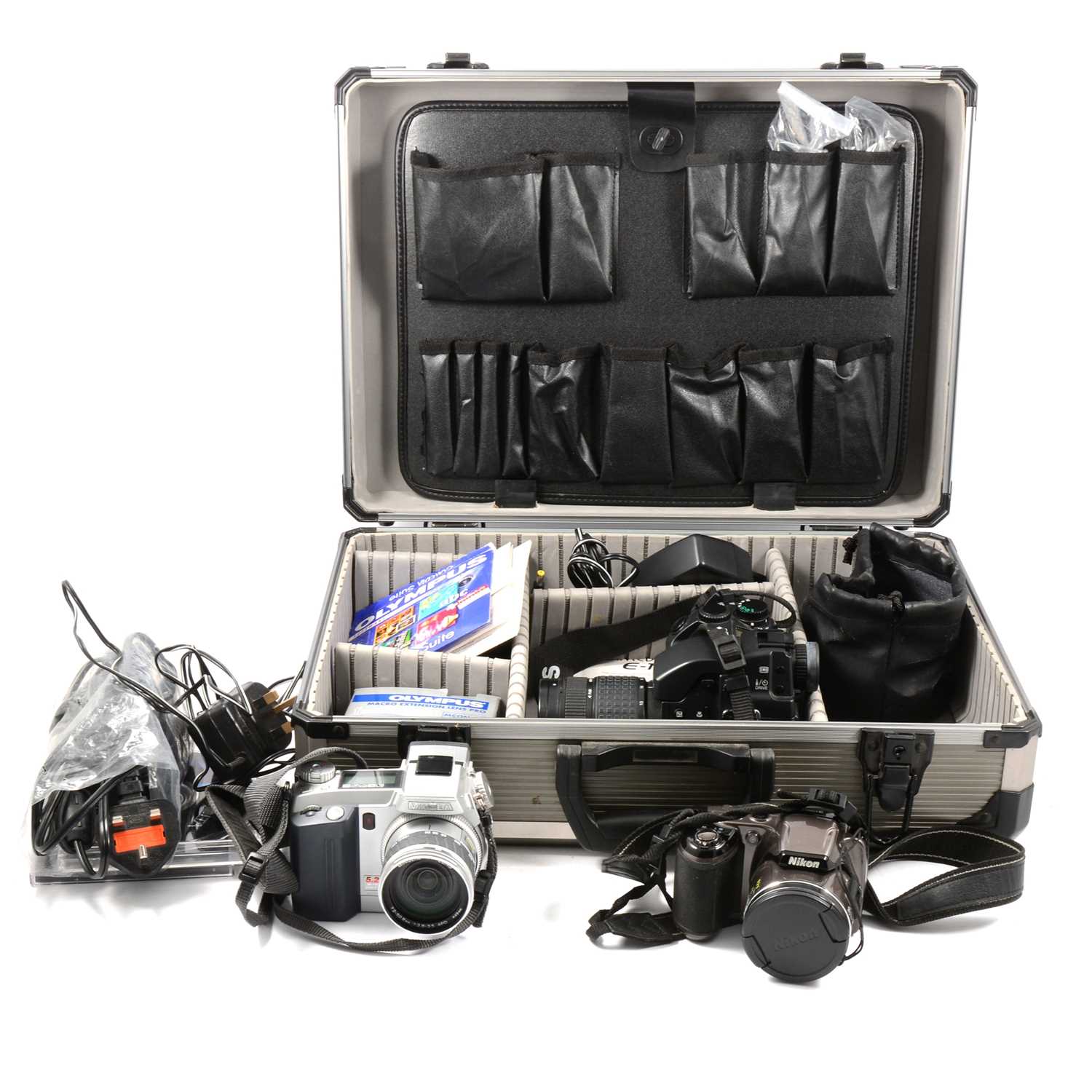 Lot 100 - Three digital cameras and accessories.