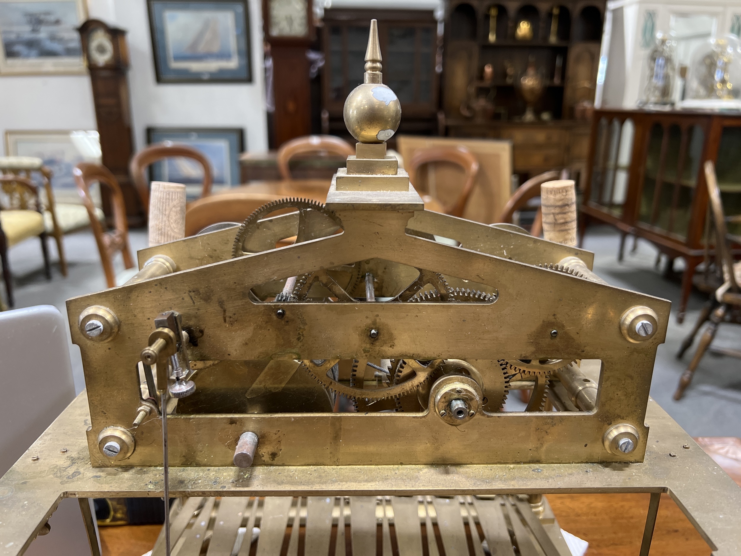 Lot 123 - Congreve brass rolling ball clock,