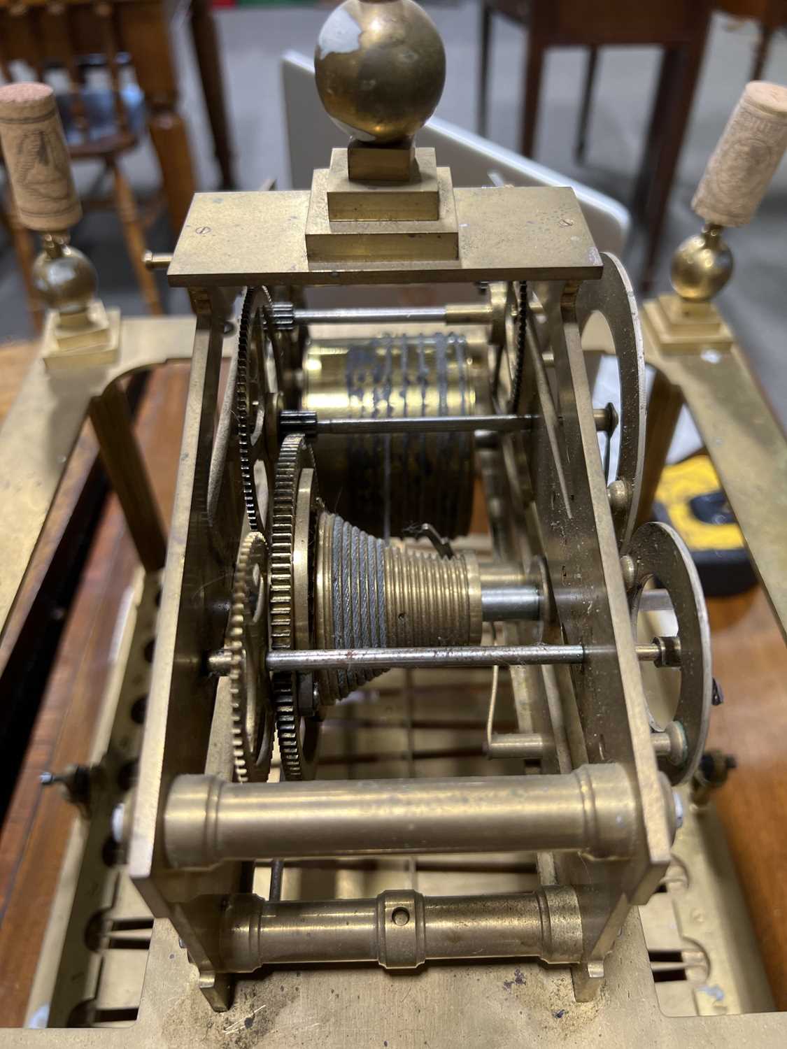 Lot 123 - Congreve brass rolling ball clock,