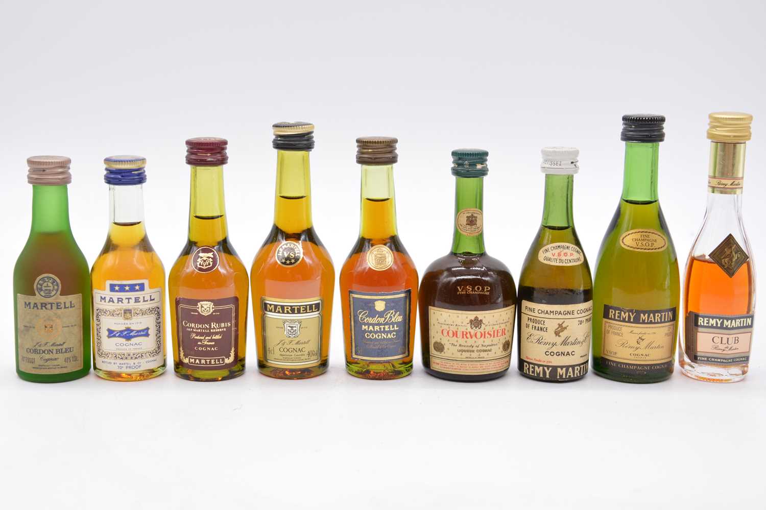 Lot 708 - Nine assorted cognac miniatures, Martell,