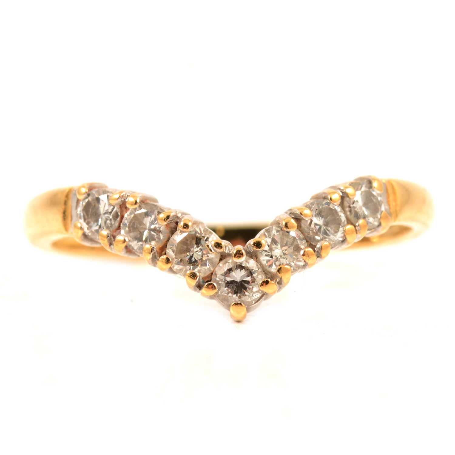 Lot 321 - A diamond wishbone ring,