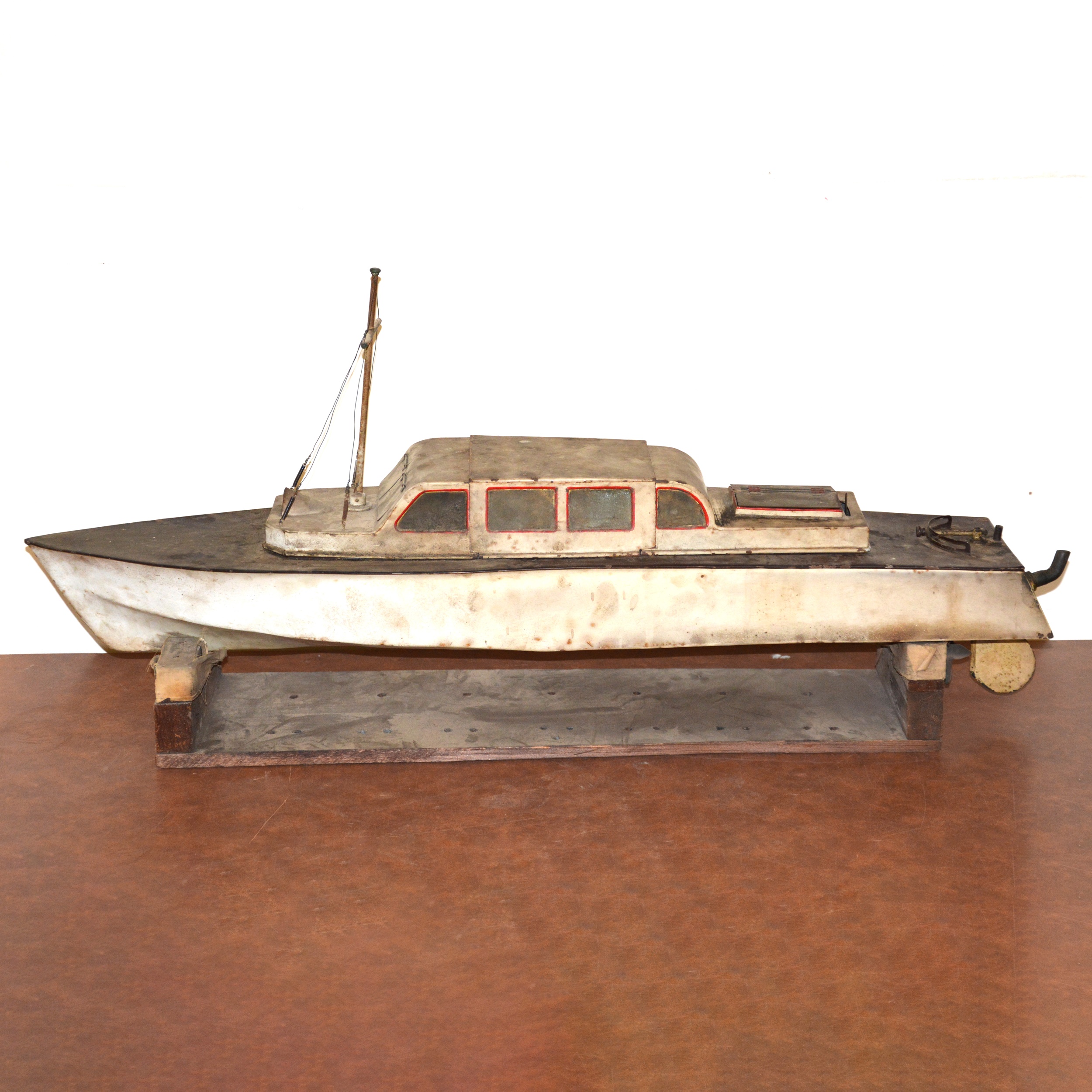 Lot 22 - Model boat with stand, metal construction,