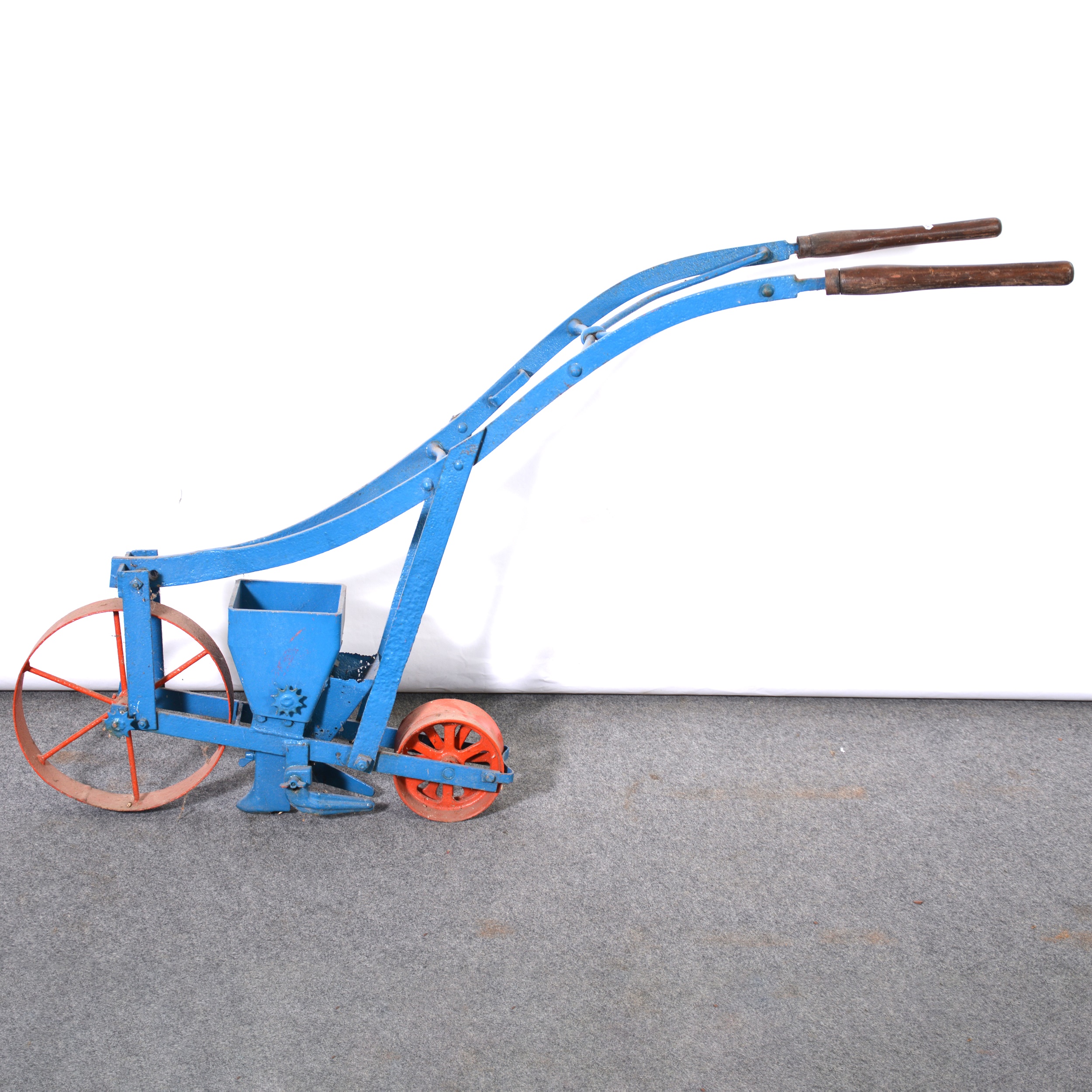 Lot 633 - Hand-ploughs, seed-drill, sack barrow and