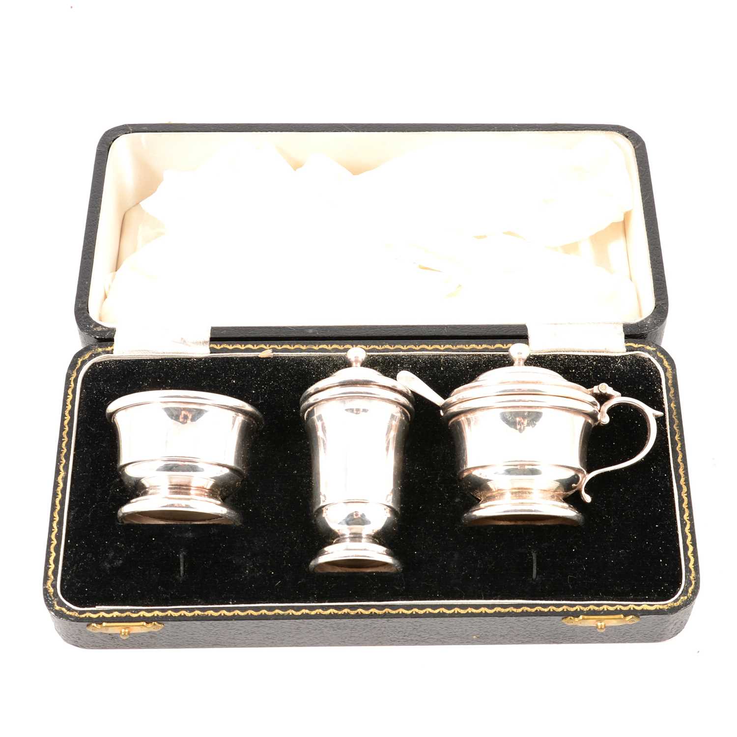 Lot 309 - A cased silver three piece condiment set by