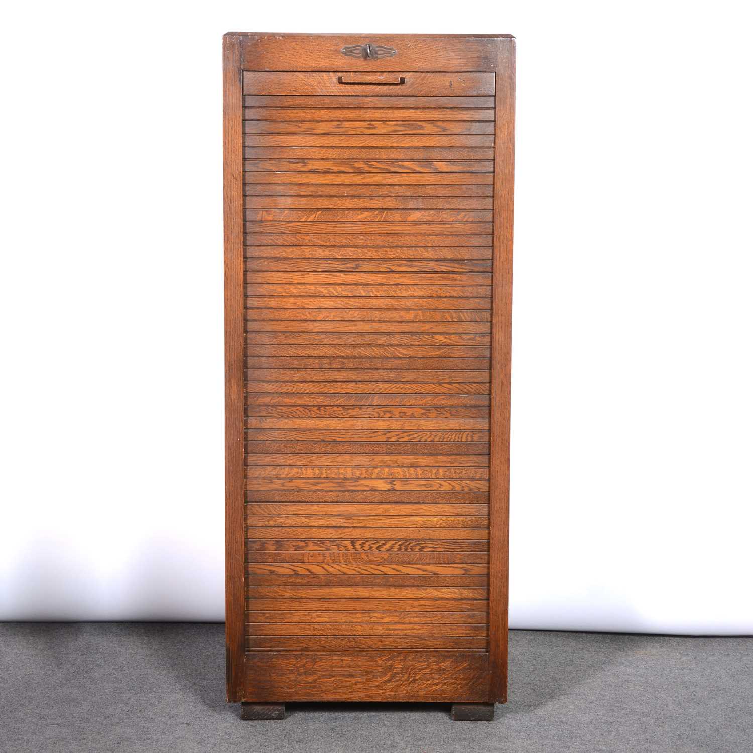 Lot 611 - Early 20th century oak tambour front filing