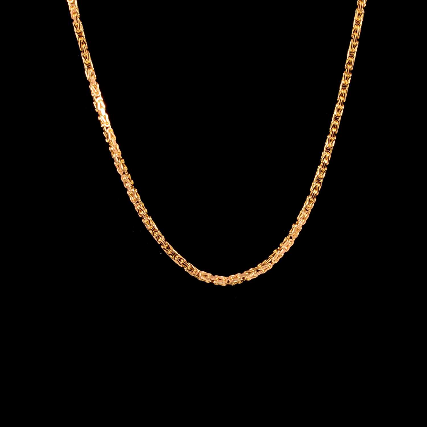Lot 218 - A 9 carat yellow gold Kings pattern chain