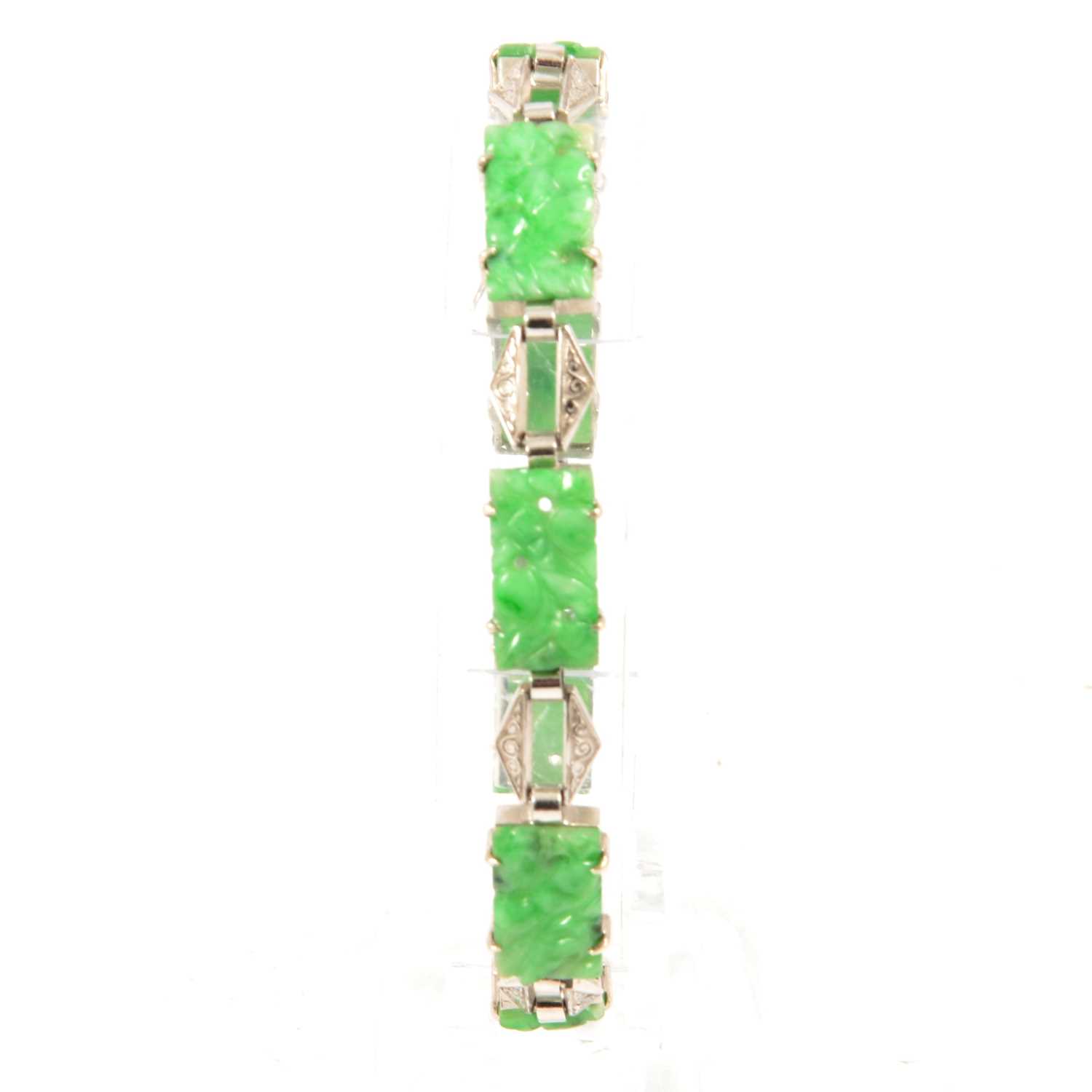 Lot 208 - A jade panel bracelet.