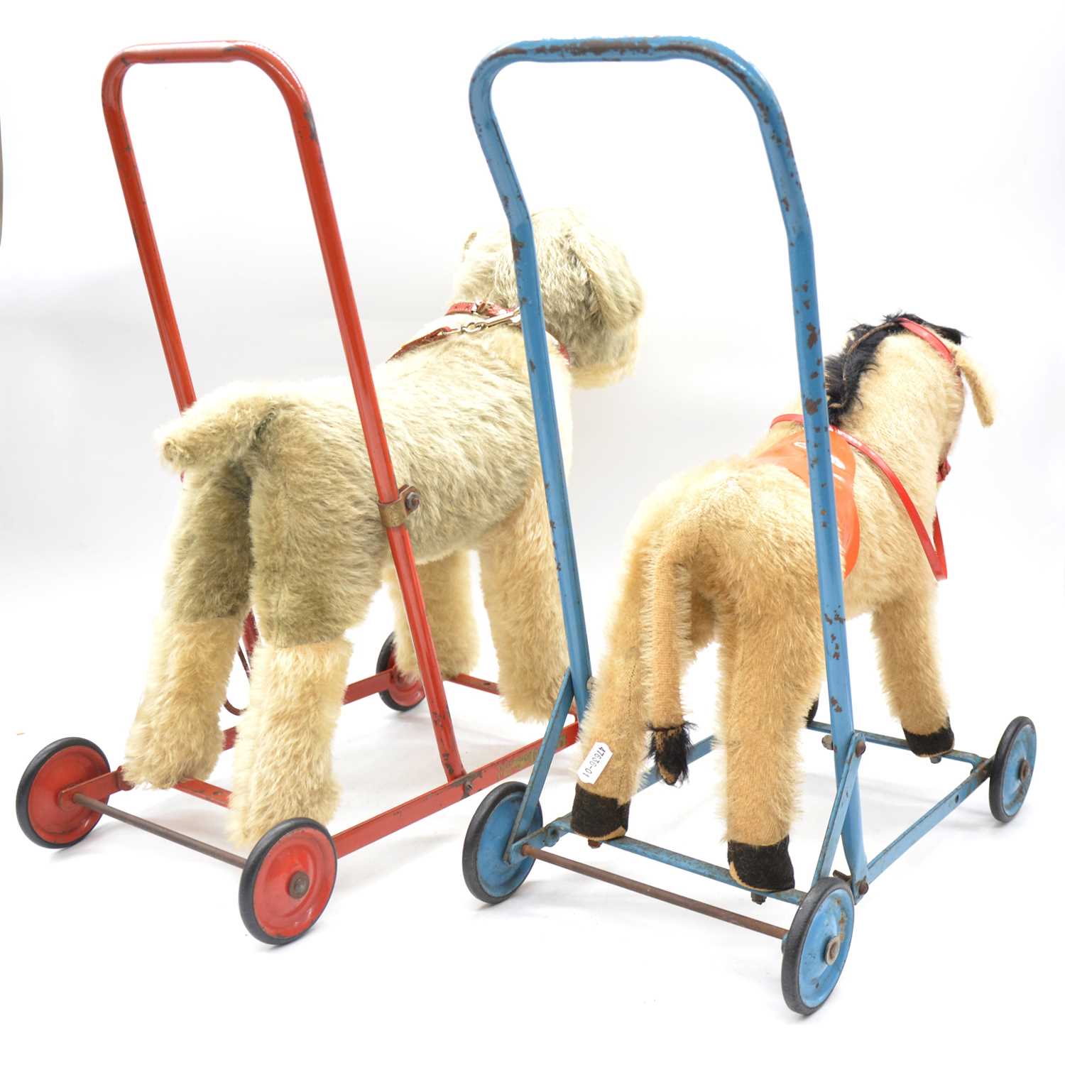 Lot 226 - Two vintage toy walkers, Merrythought dog