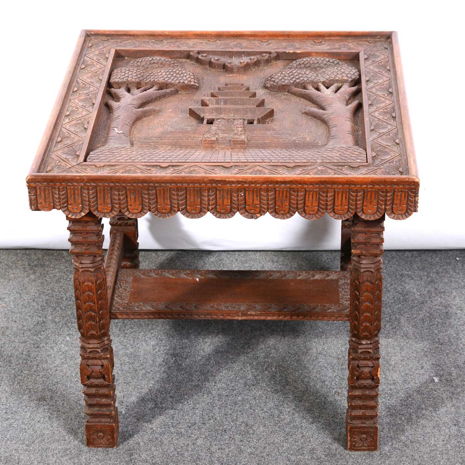 Lot 545 - Asian carved softwood table, and a panel,