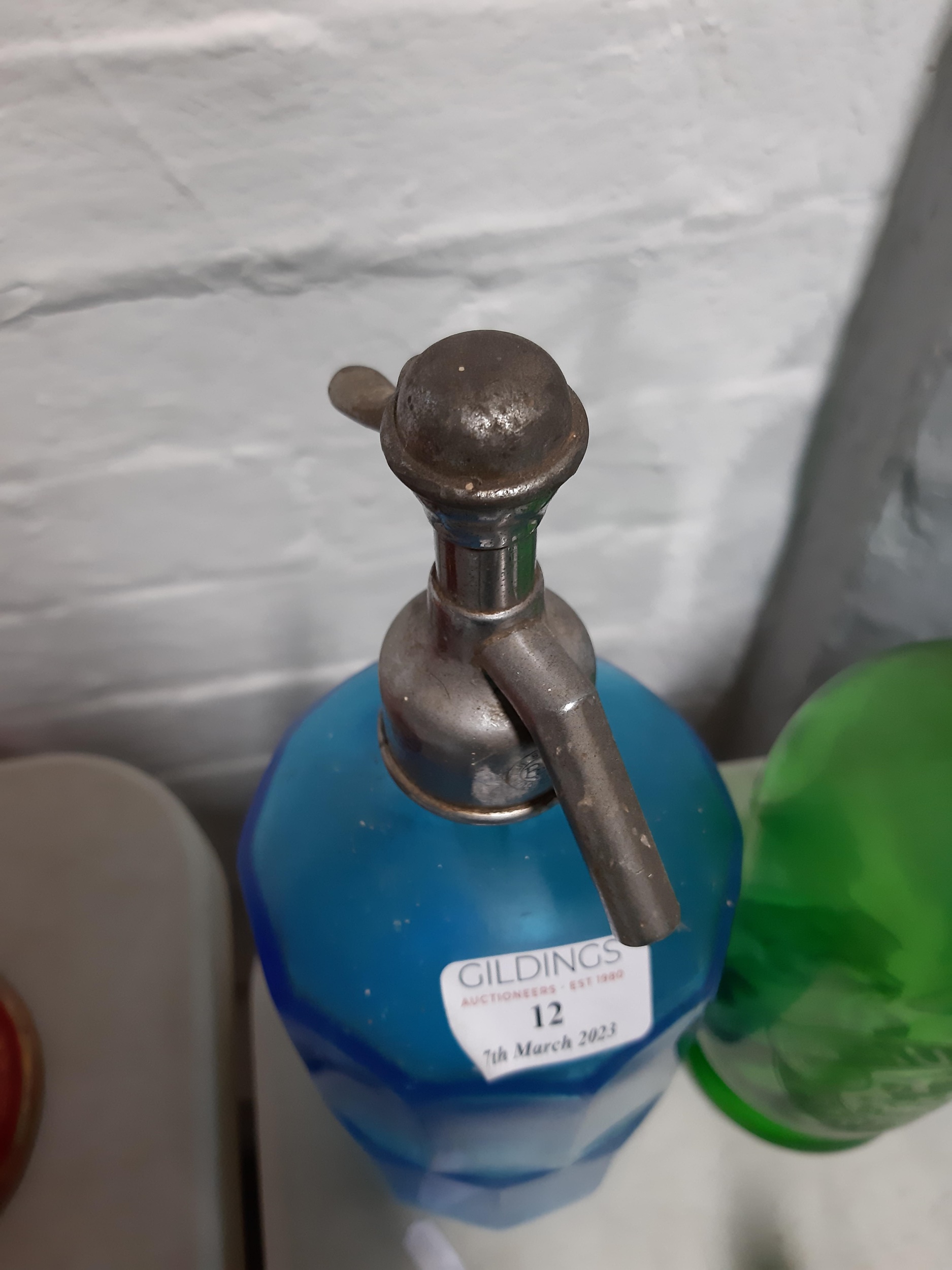 Lot 12 - Three coloured glass soda syphons