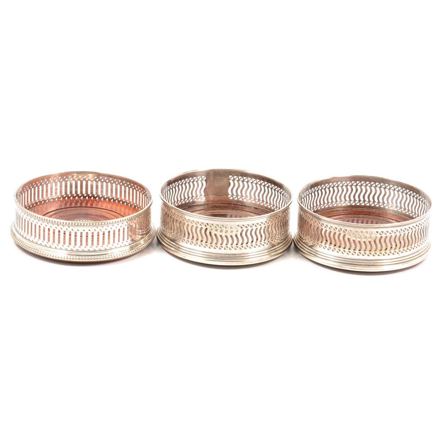 Lot 422 - Pair of silver coasters and one other,