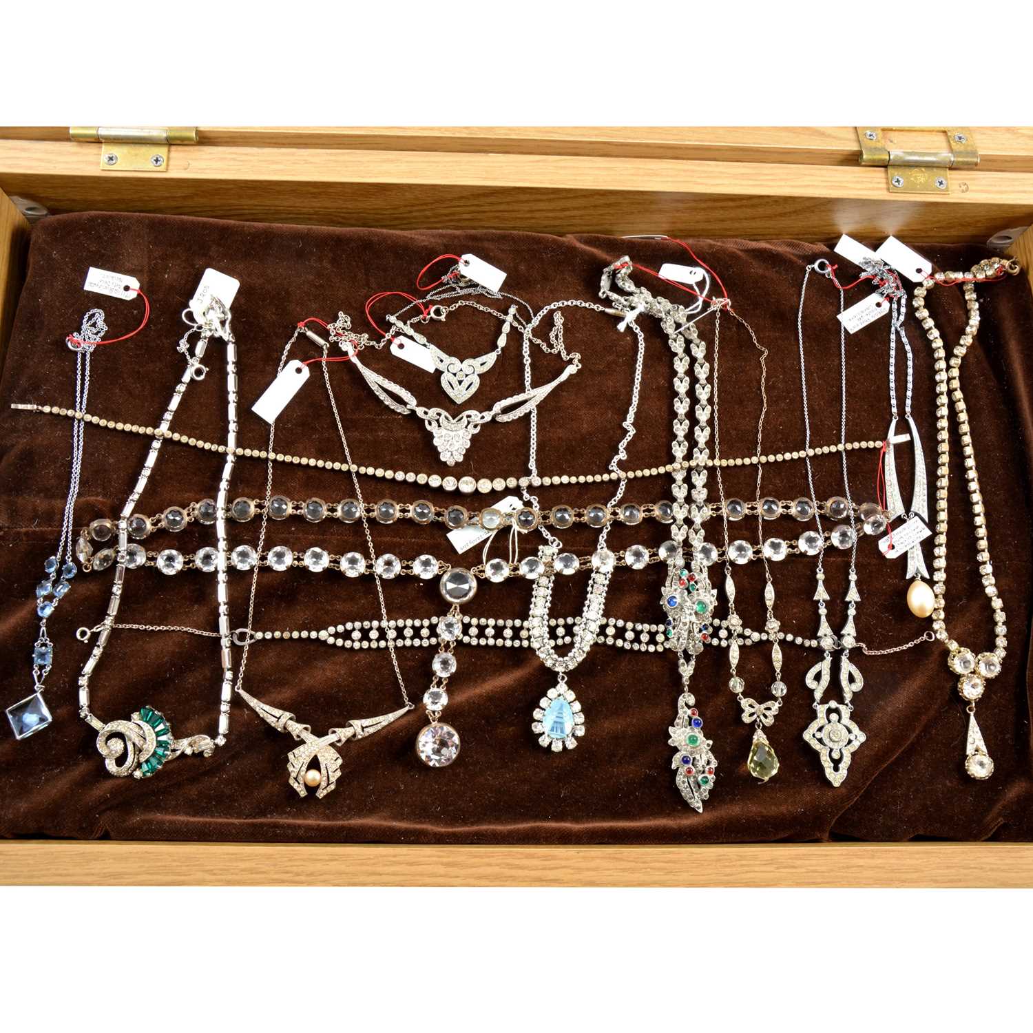Lot 483 - Twenty vintage paste set necklaces, pendants,