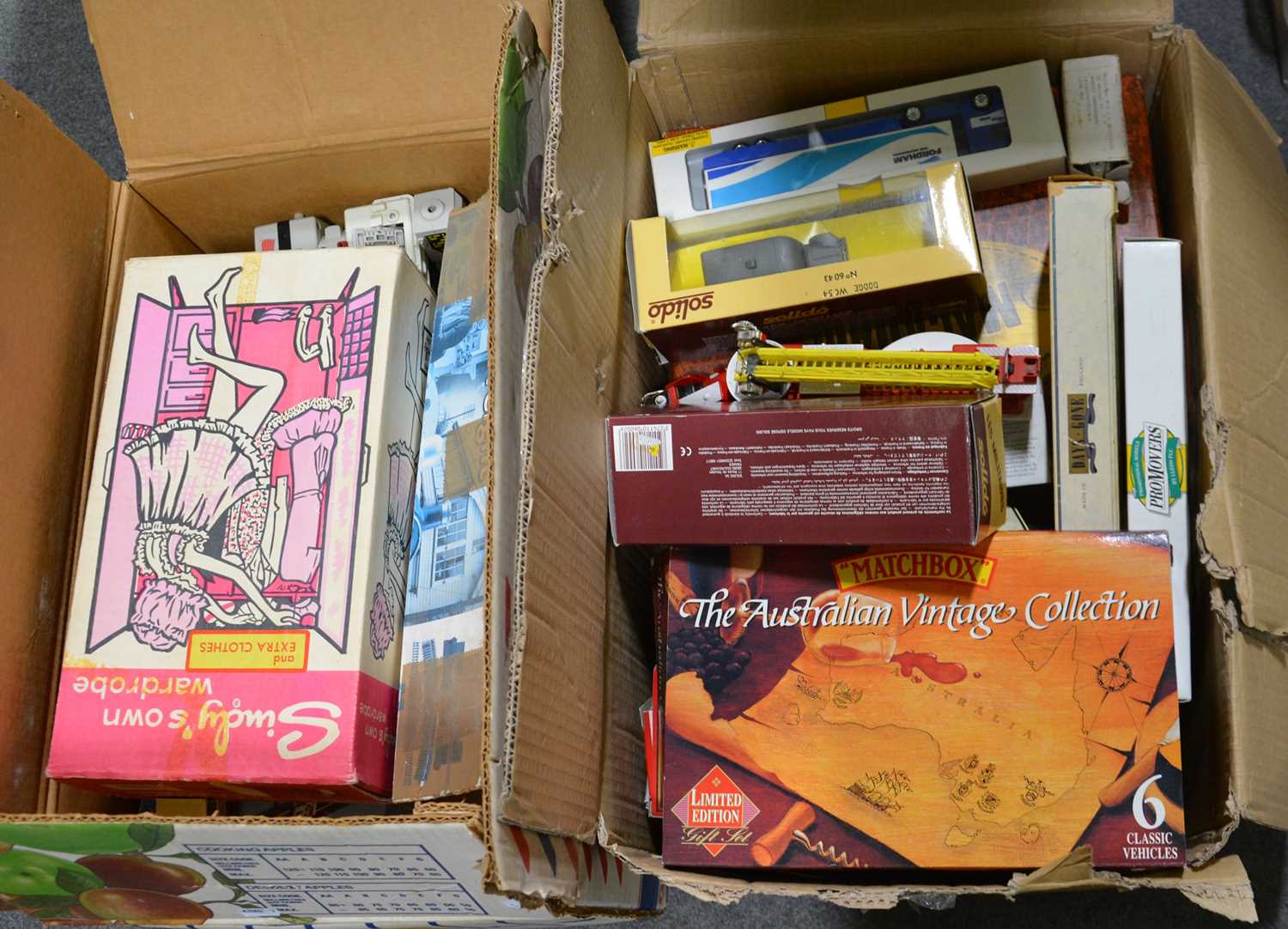 Lot 218 - Two boxes of models and toys, including