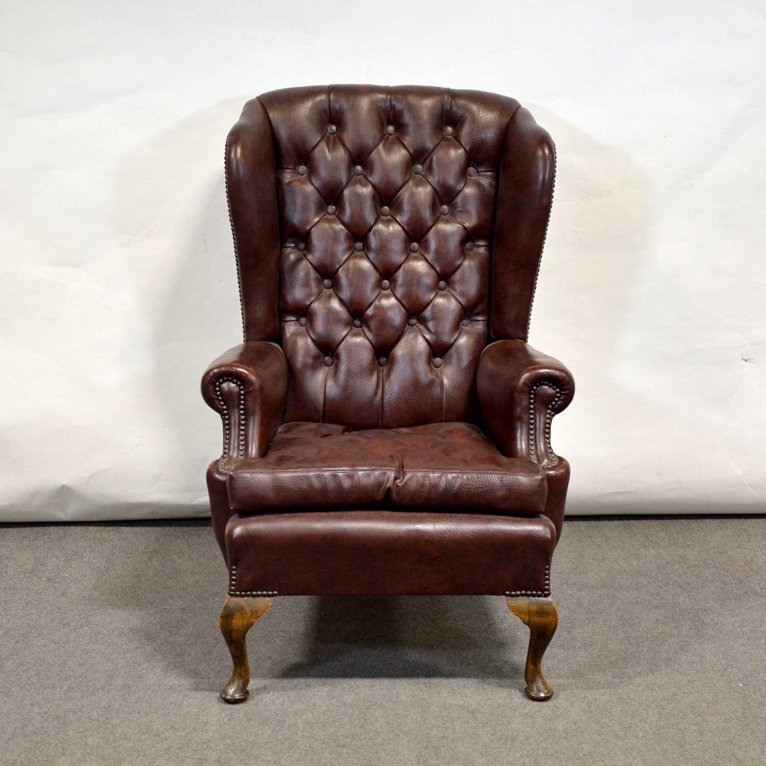 Lot 463 - Wing back easy chair,