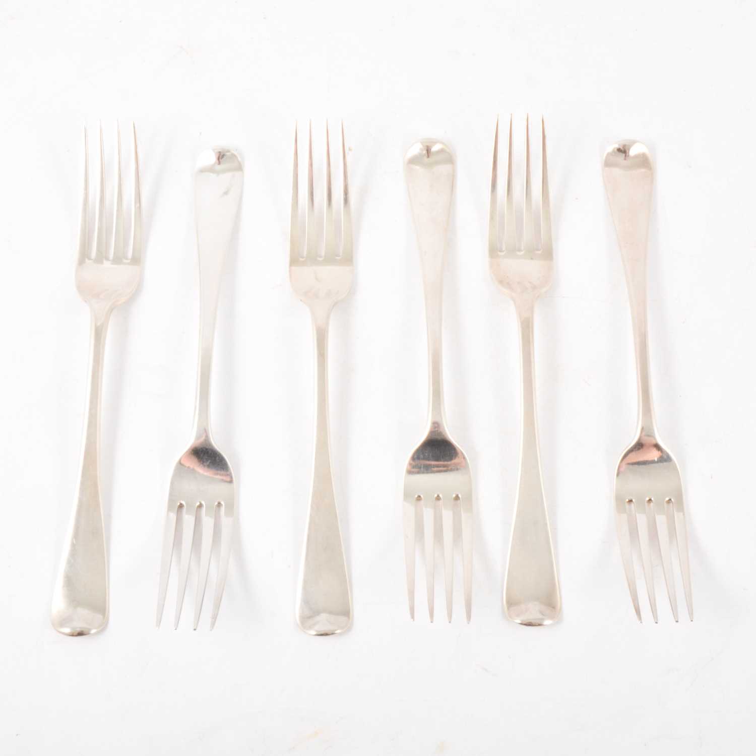Lot 453 - Set of six silver table forks,