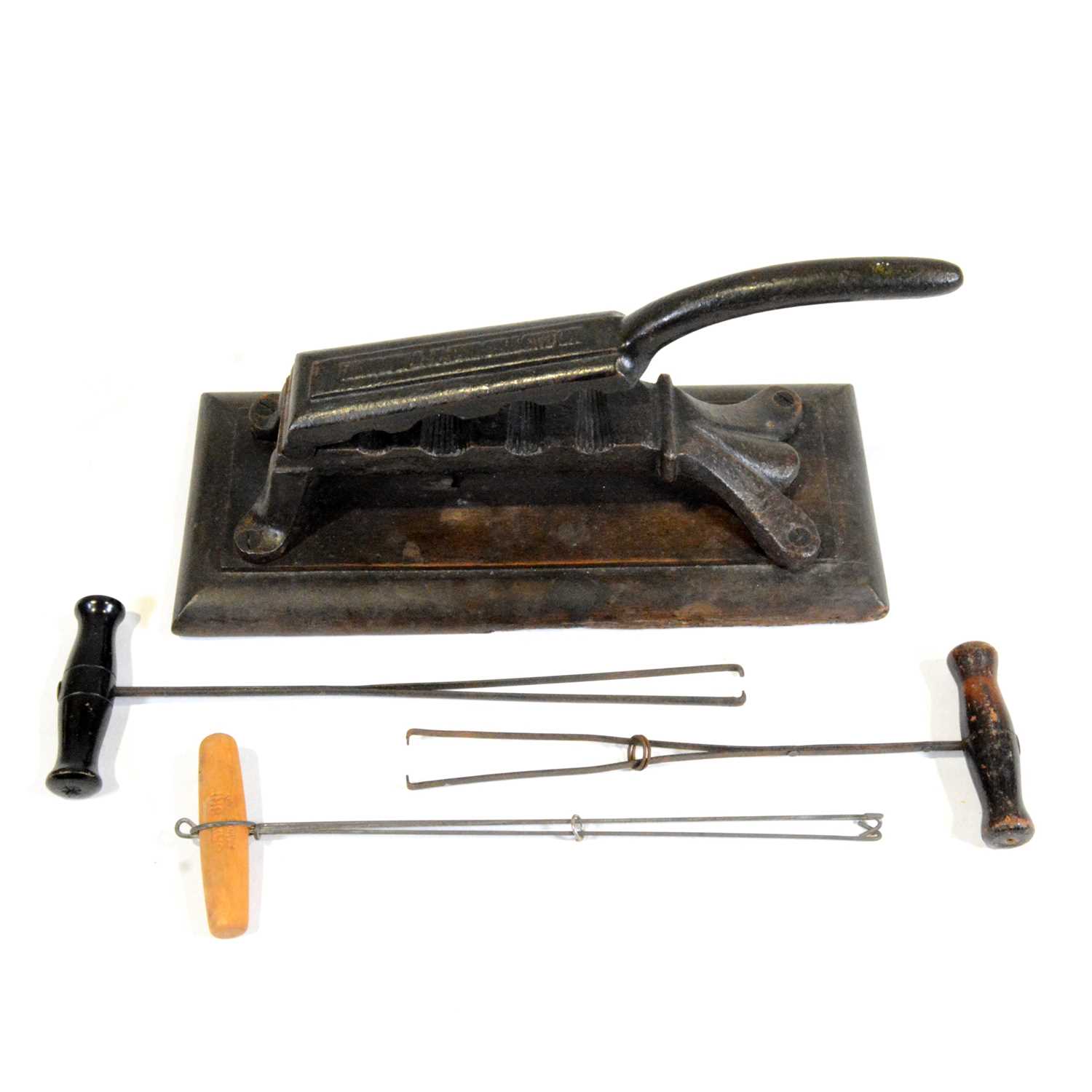 Lot 162 - Farrow & Jackson cork press and three cork