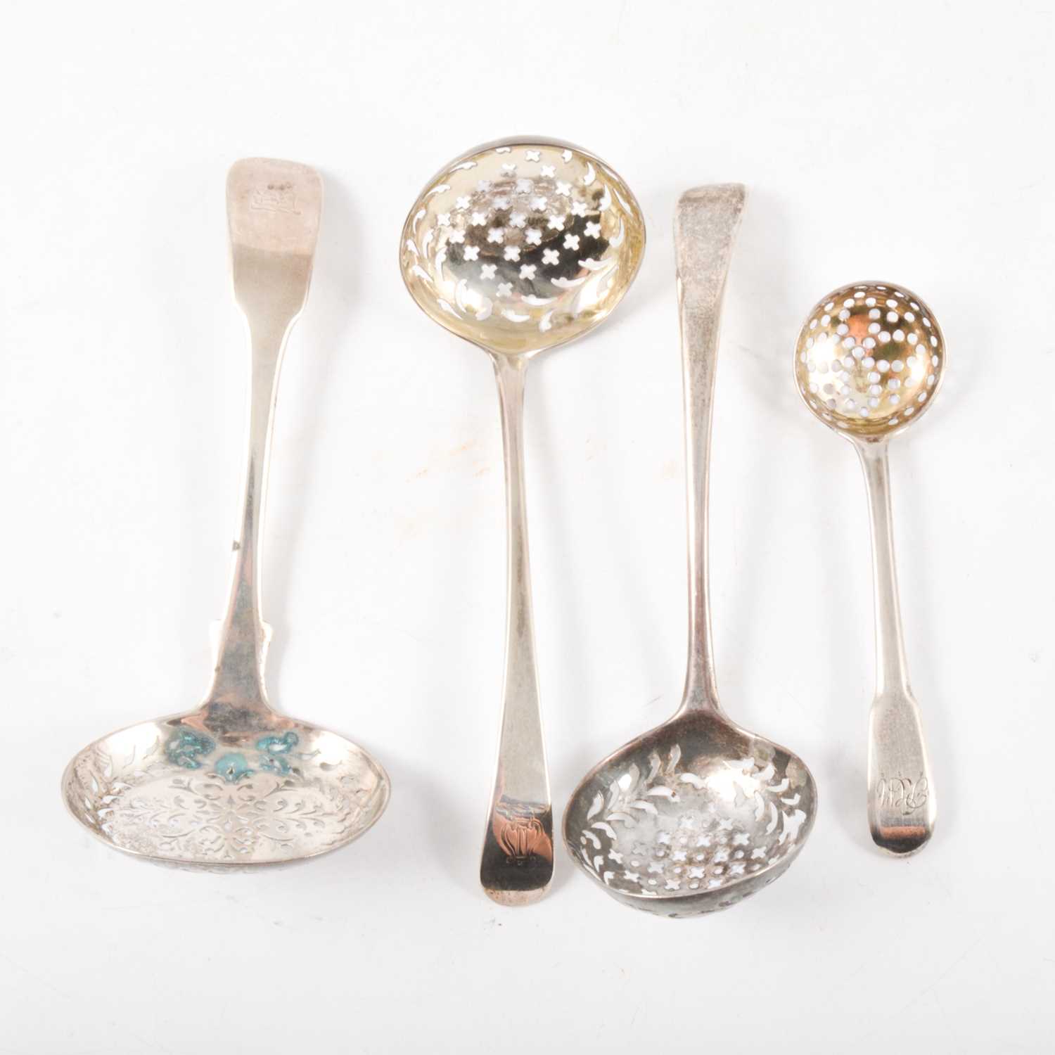 Lot 269 - Four silver sifter spoons,