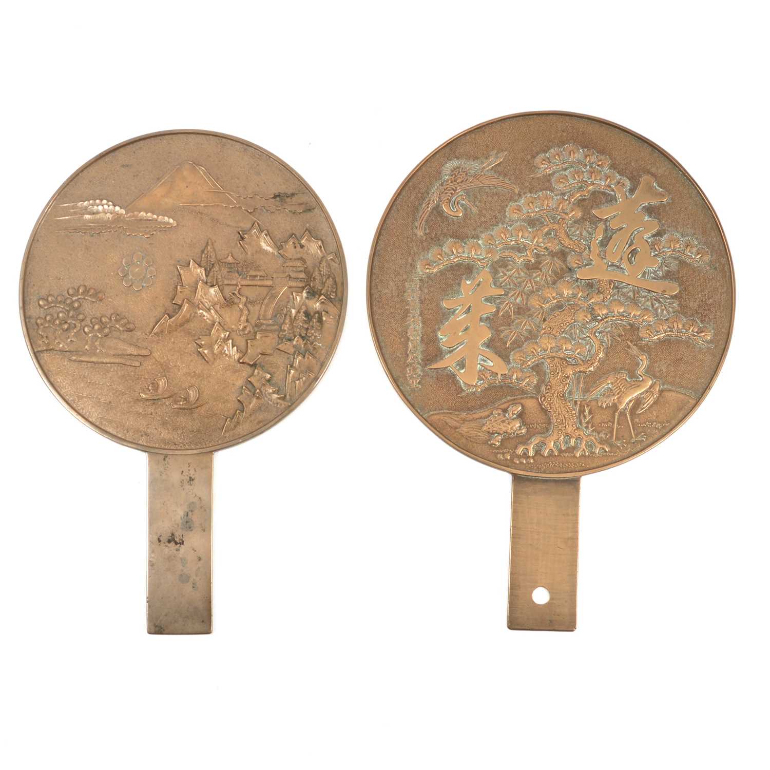 Lot 92 - Two Japanese bronze hand mirrors,