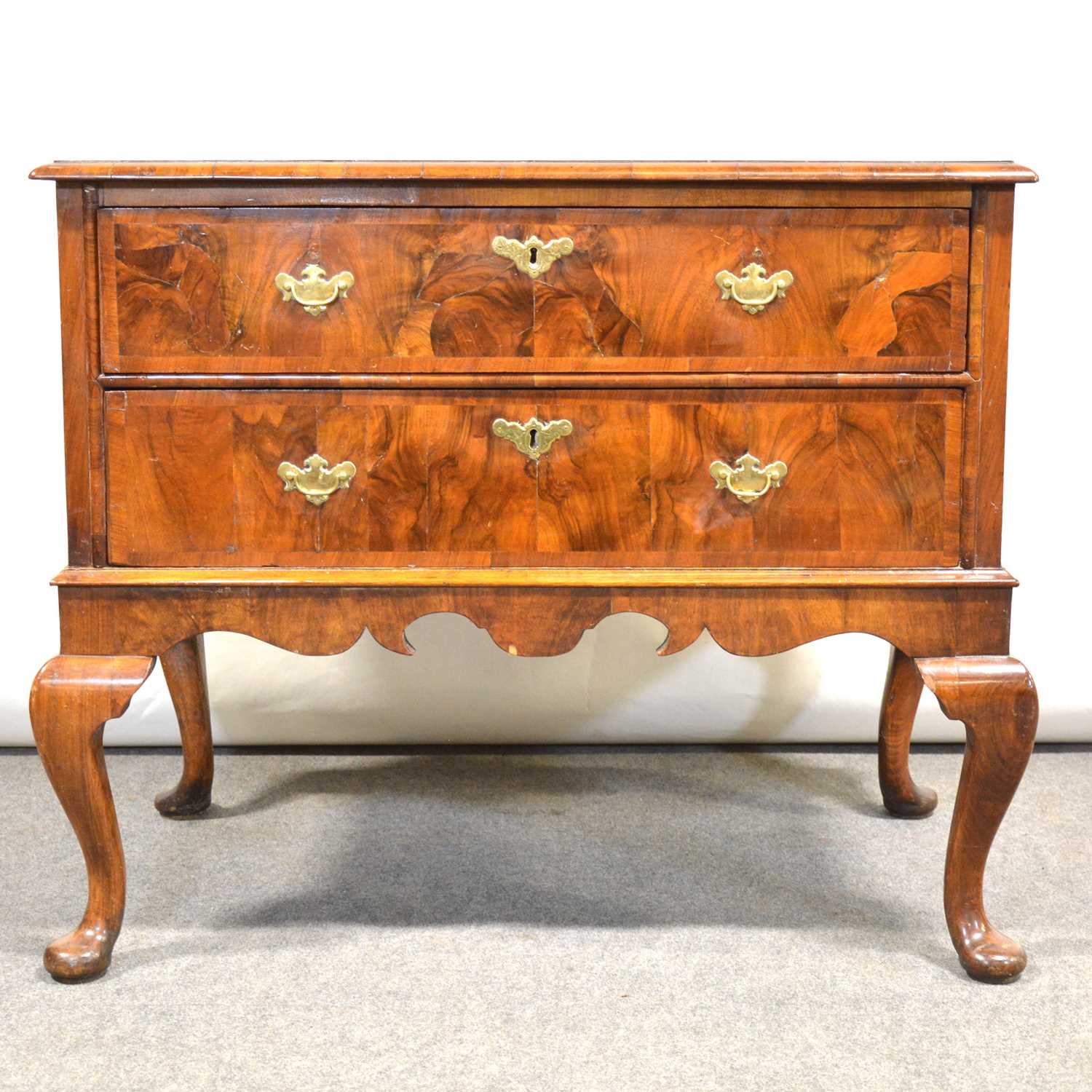 Lot 374 - Walnut chest of drawers, on cabriole legs,