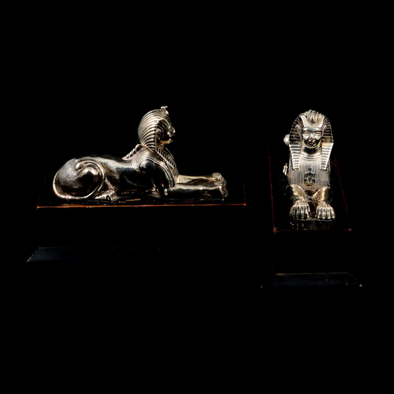 Lot 271 - Pair of silver models, sphinx,