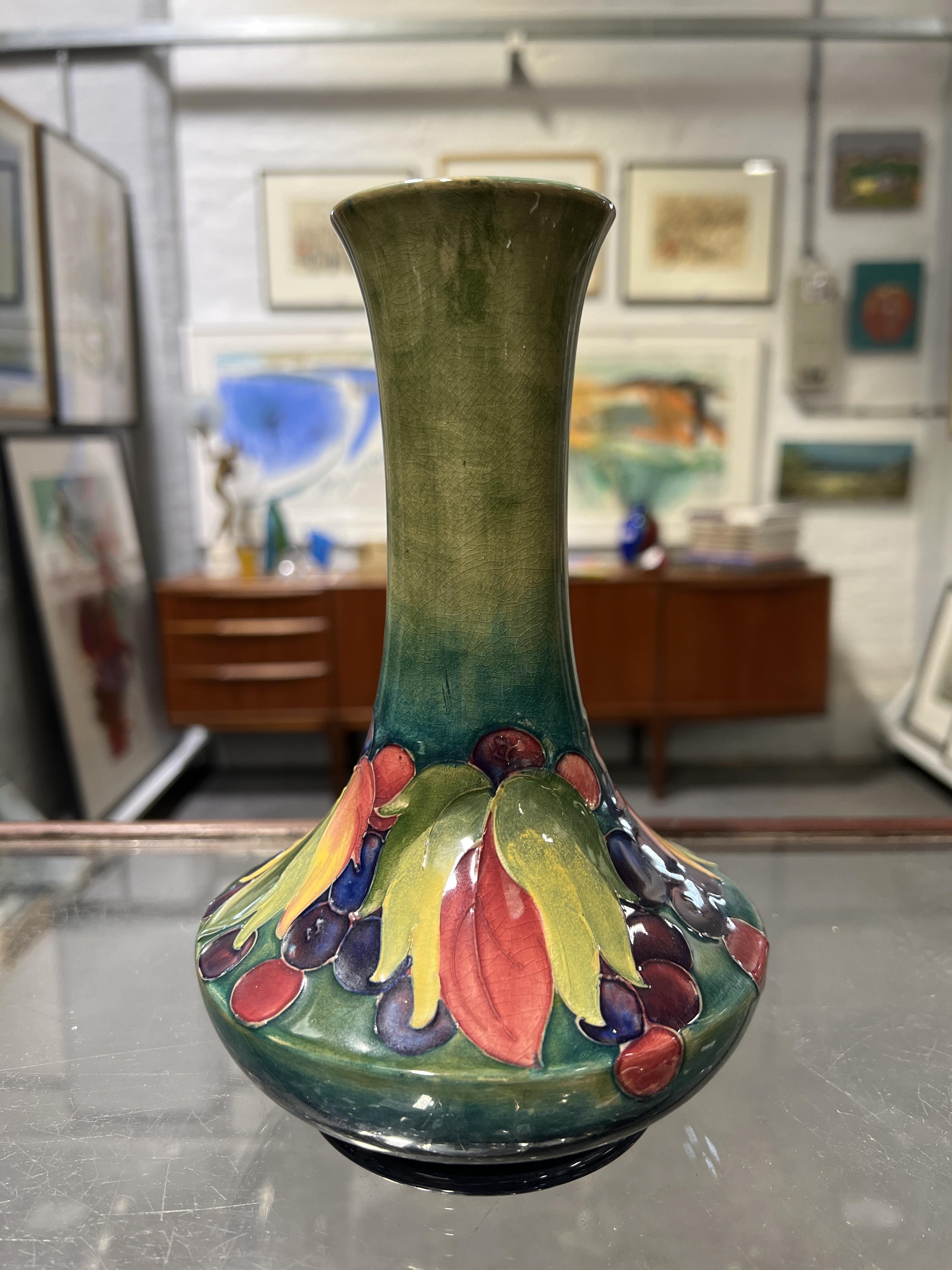 Lot 527 - Moorcroft Pottery, a 'Leaf and Berry' design
