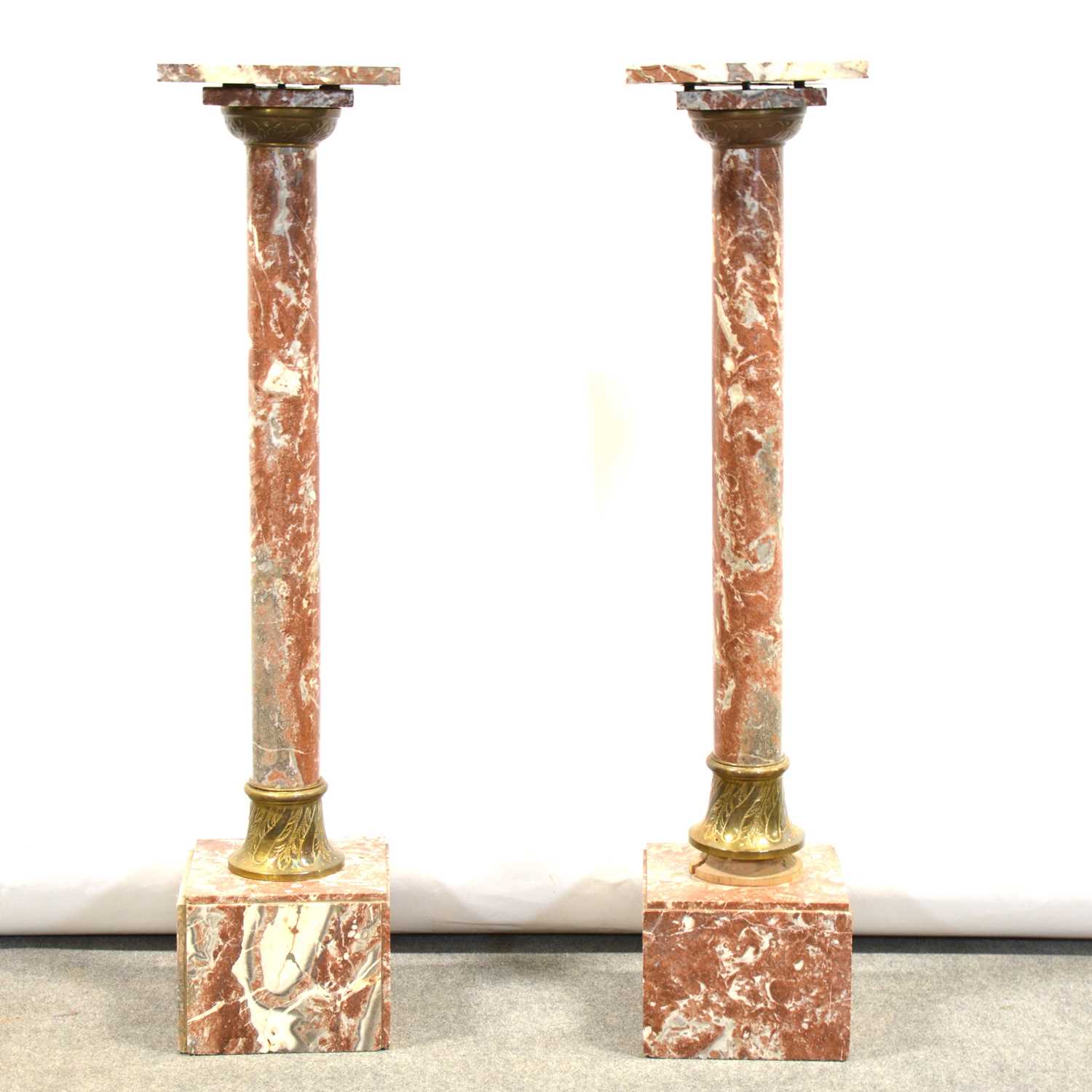 Lot 394 - Pair of variegated marble columns,