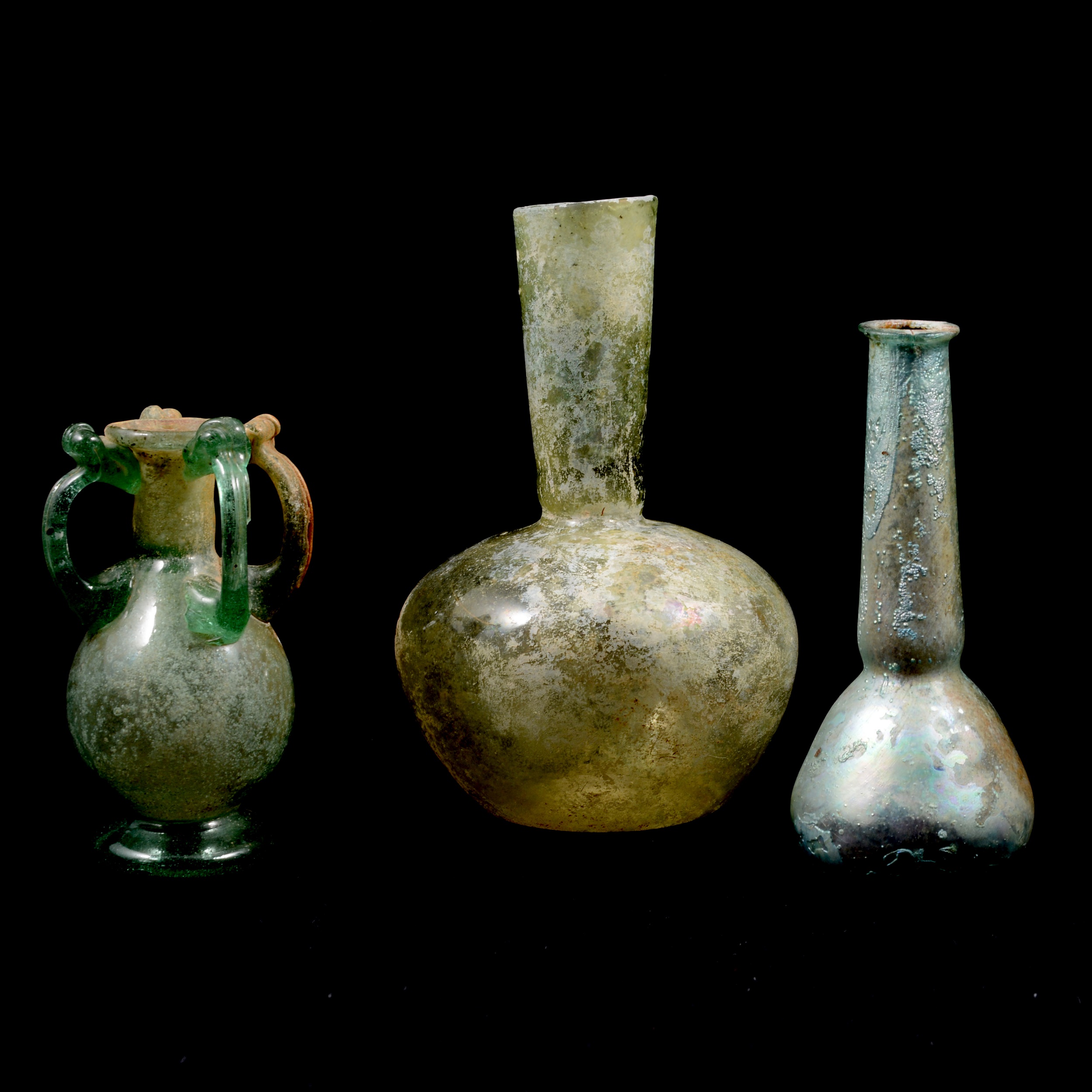 Lot 1 - Three Roman glass vessels,
